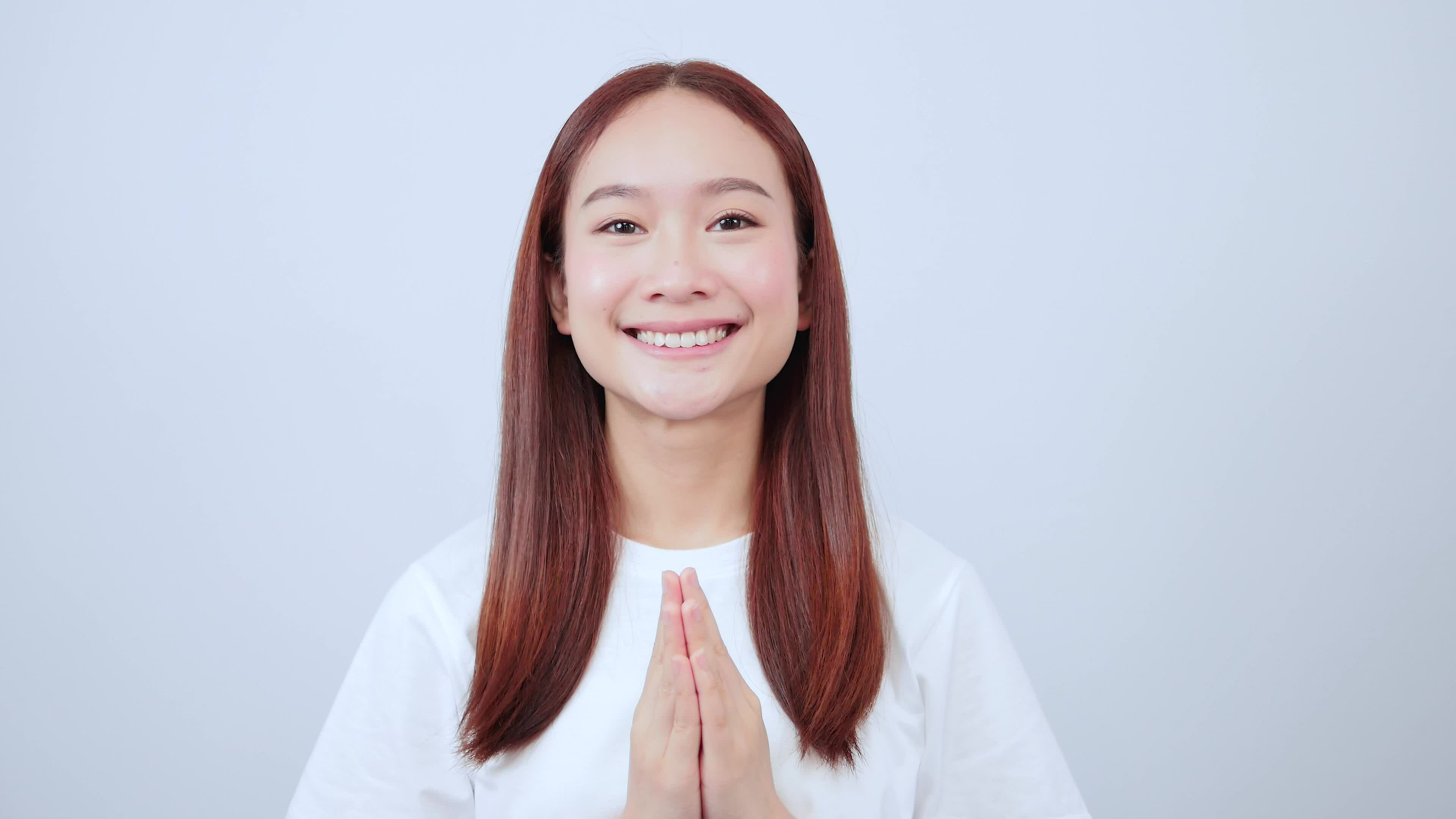 asian girl laughing and smiling expressing gratitude, namaste gesture, thank you. 23650838 Stock ...
