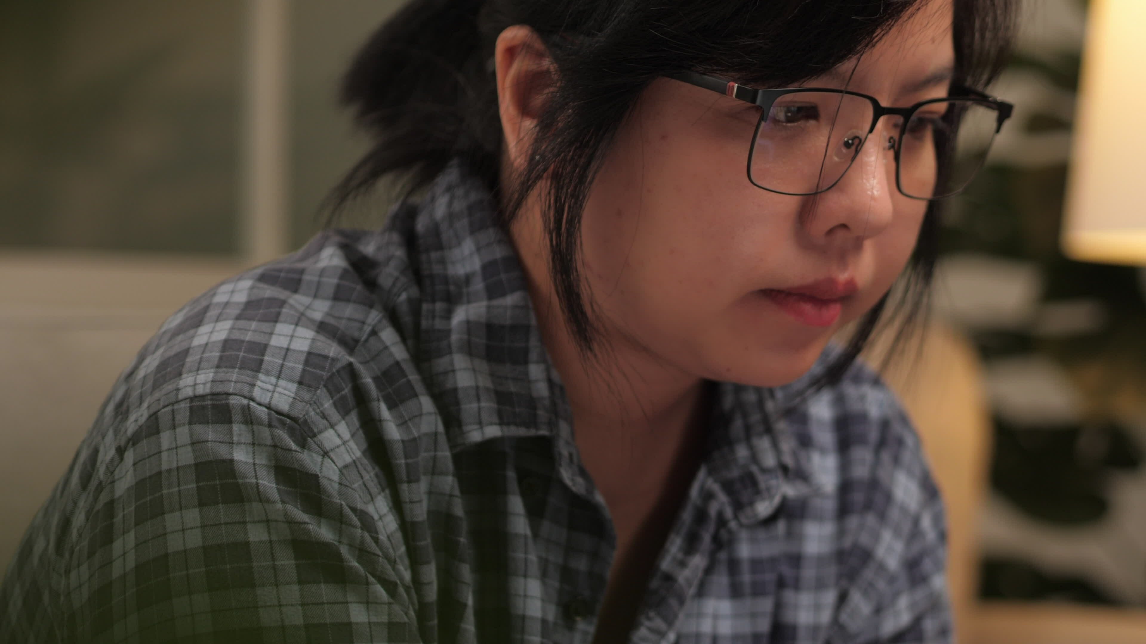 Close up young adult Asian woman, freelance data scientist work ...