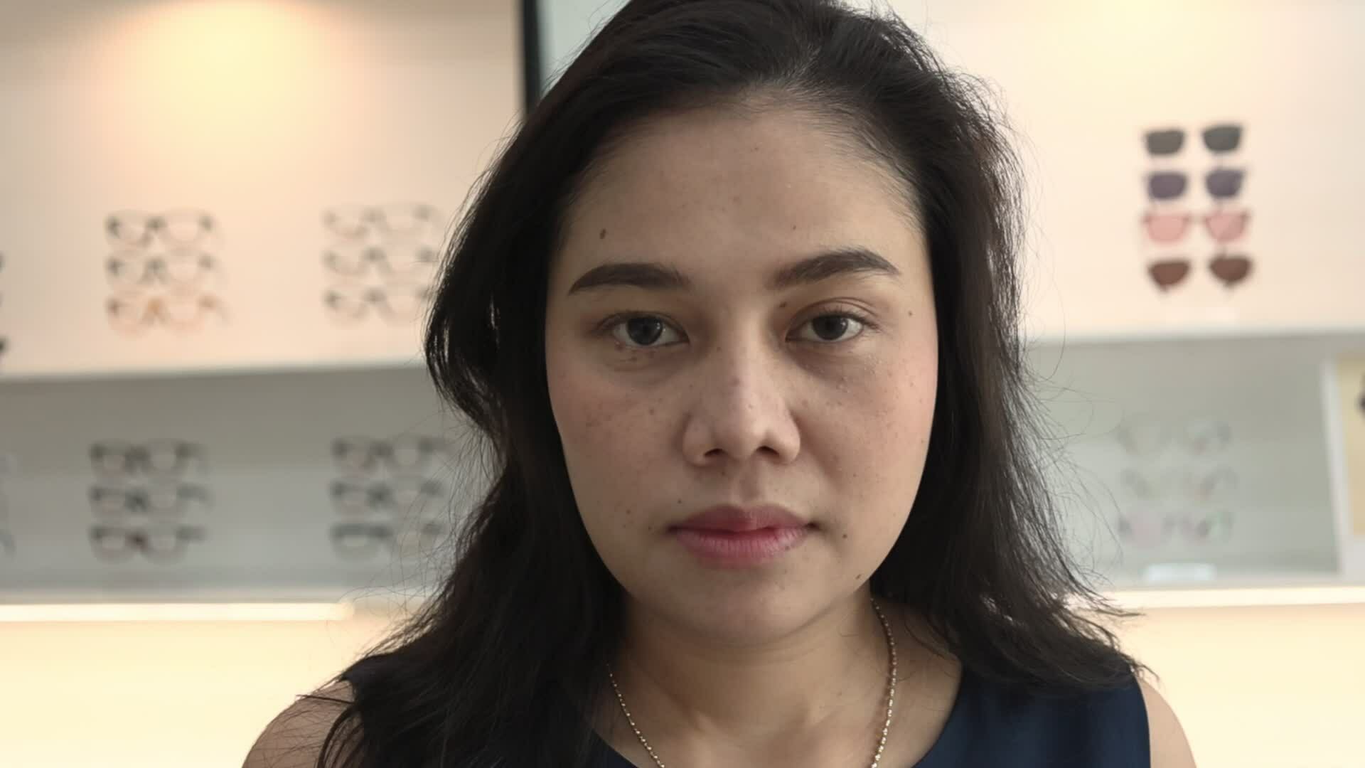 Slow motion of a beautiful Asian woman's face 23952404 Stock Video at Vecteezy