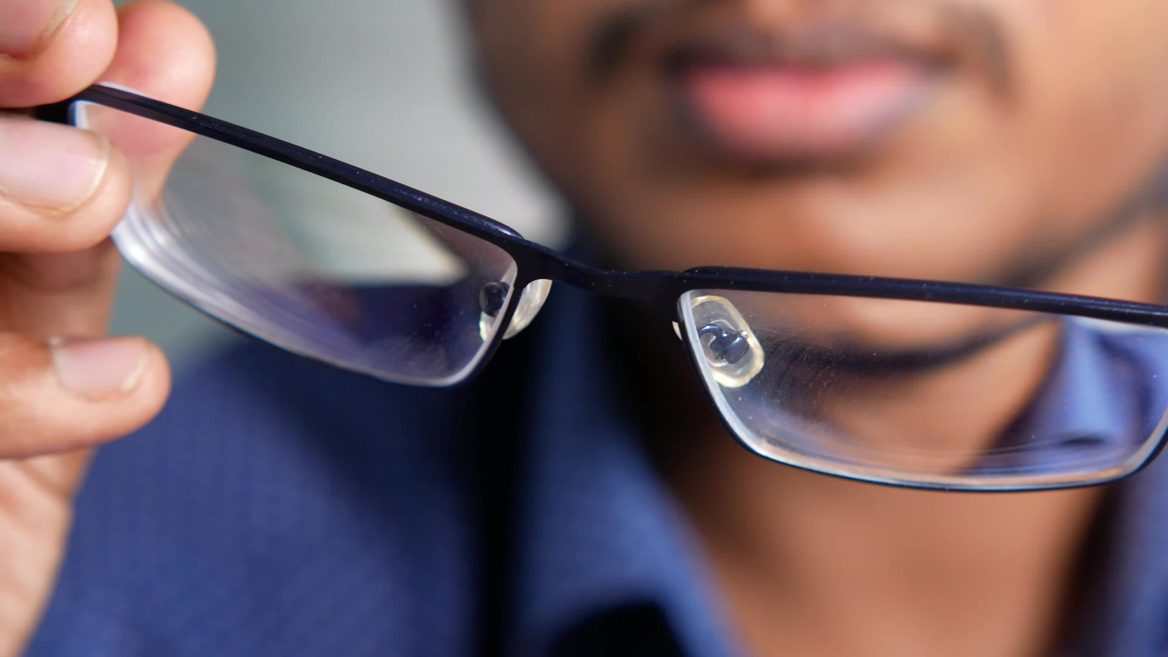 Close Up Of Man Hand Holding Old Eyeglass 24694962 Stock Video At Vecteezy