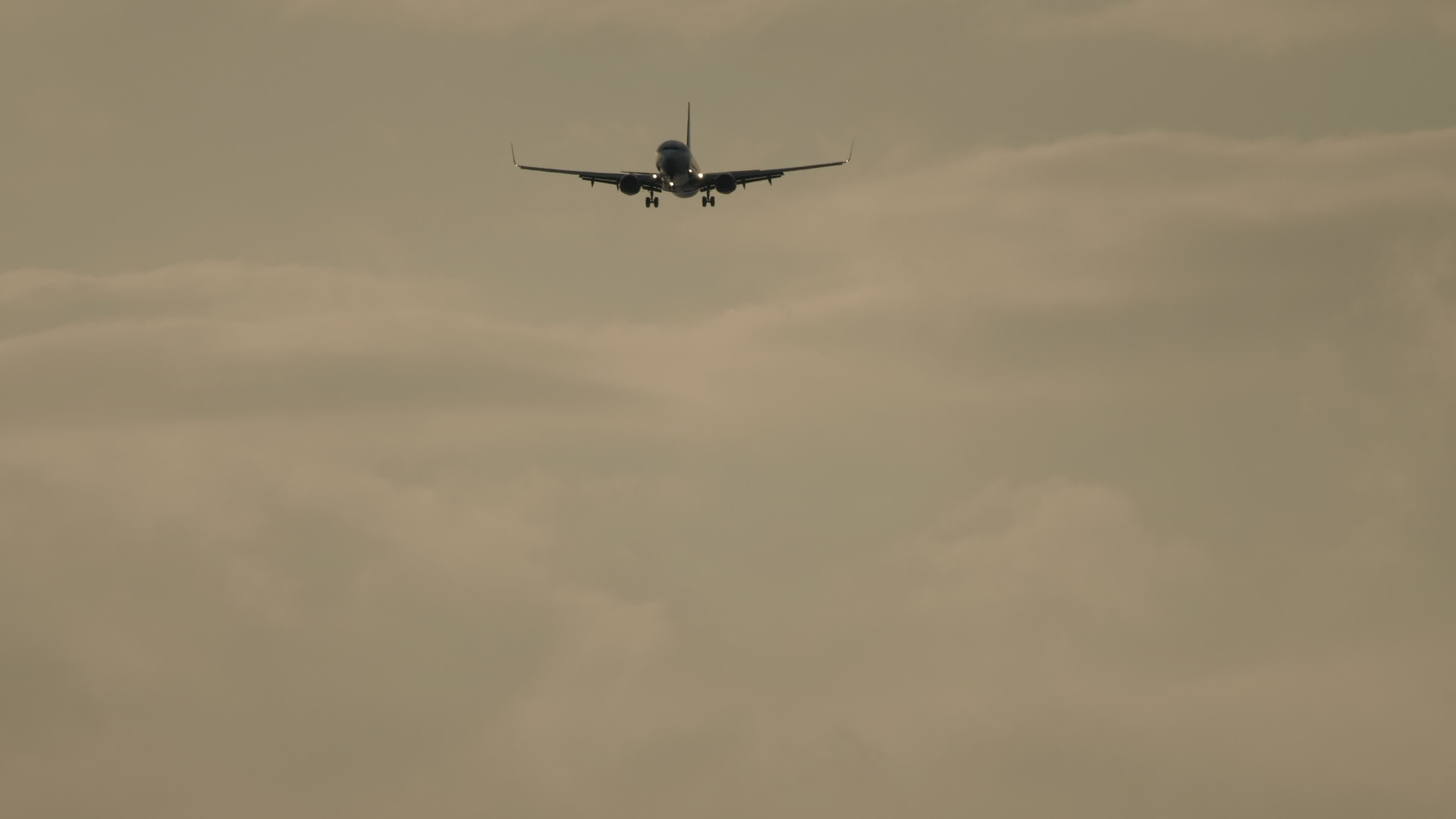 Footage Of An Airplane Approaching To Land At Sunset Airliner Flight