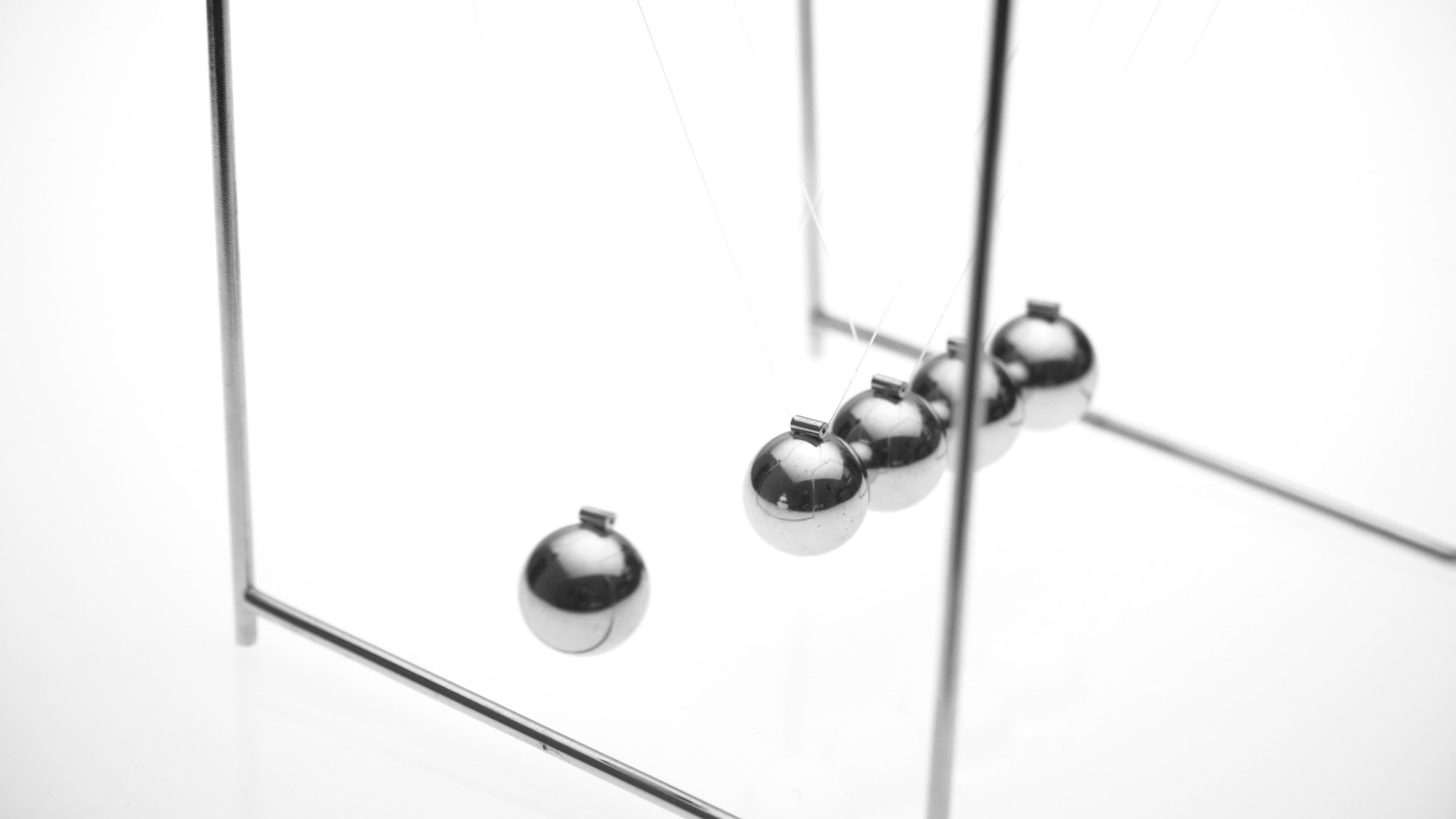 Balancing balls on a white background, isolated. business concept. Newtons Cradle 26792054 Stock ...
