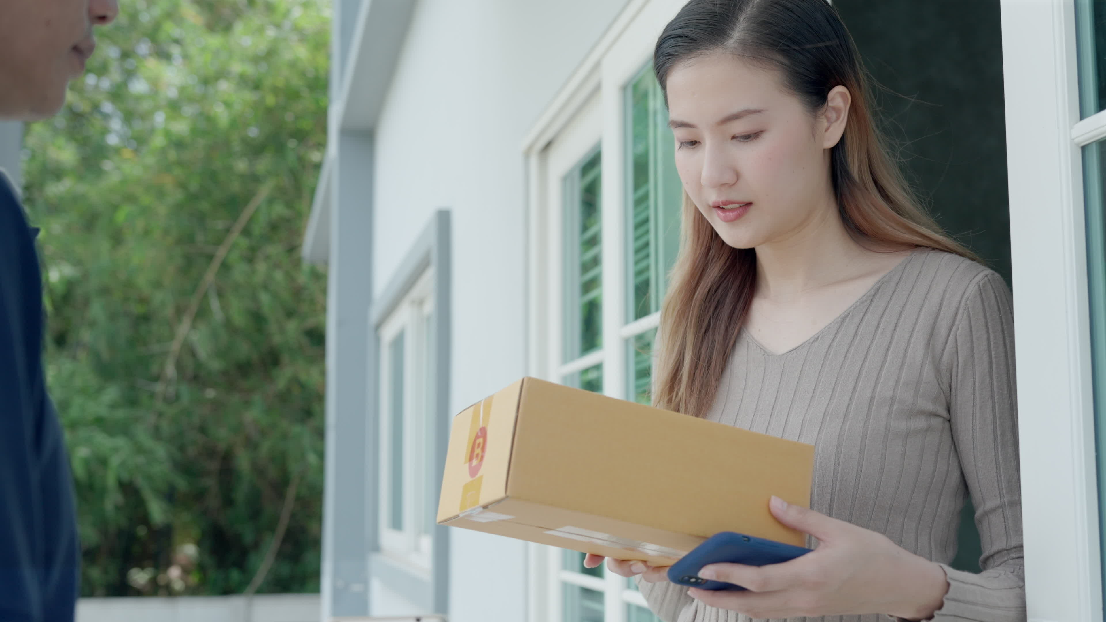 Happy smile Asian woman scan QR code for pay of food. Delivery man send deliver express. online ...