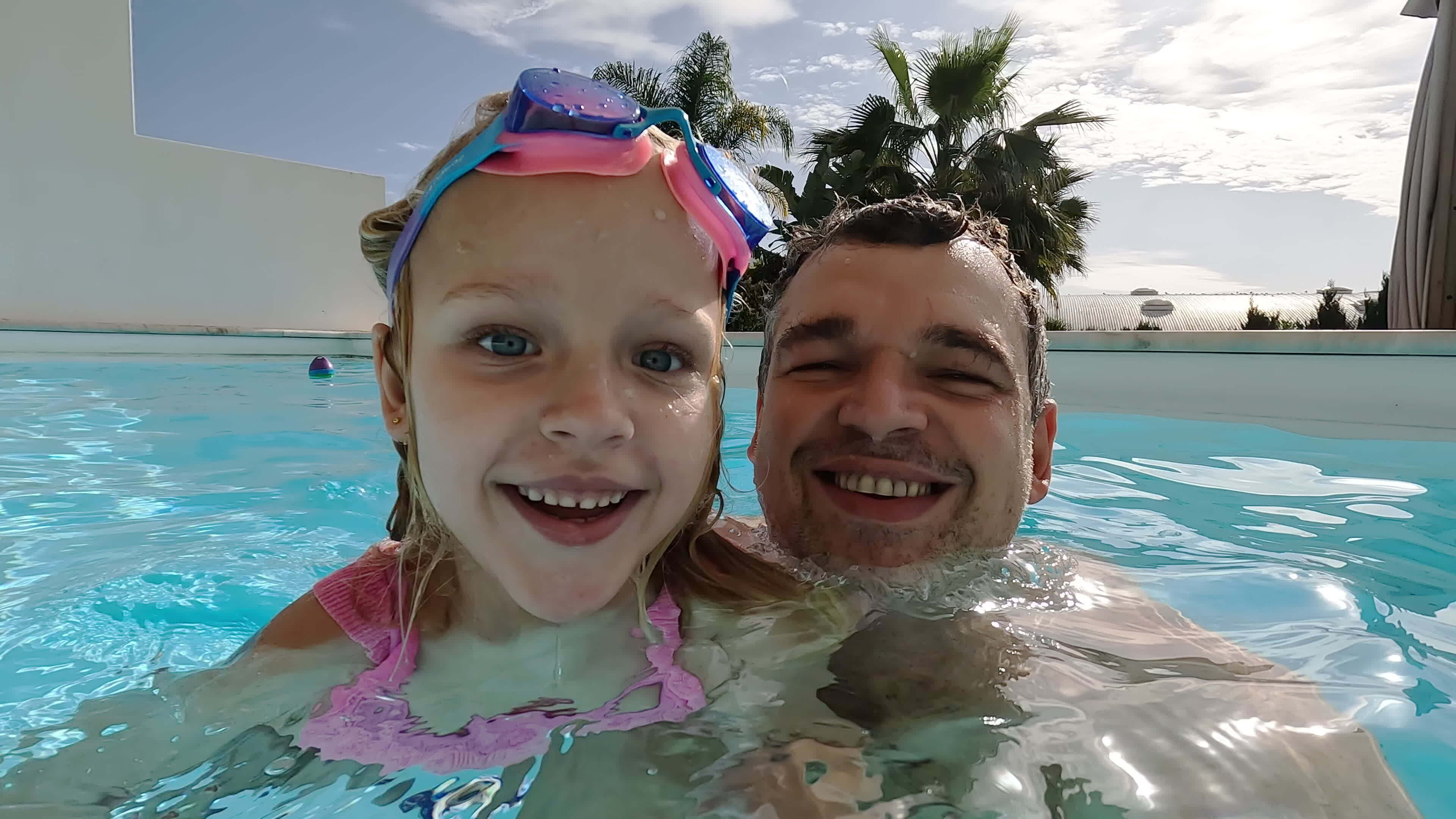 Daddy and daughter in swimming pool 28325007 Stock Video at Vecteezy
