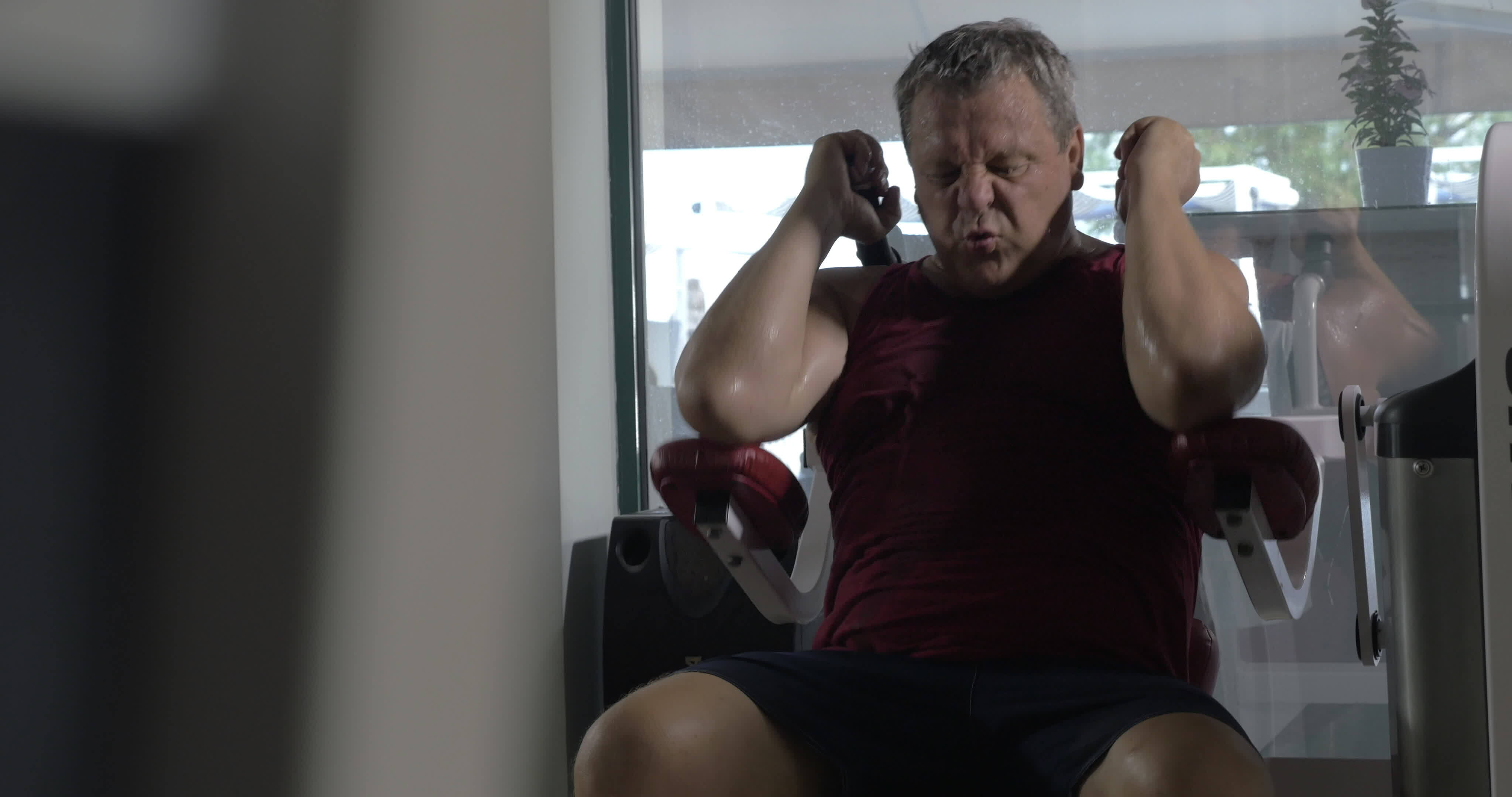 Tired senior man training on exercise machine 28542608 Stock Video at ... Tired senior man training on exercise machine 28542608 Stock Video at ...