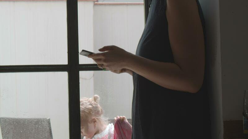 Child wants some attention, but mum is so busy with her phone 28679832 ... Child wants some attention, but mum is so busy with her phone 28679832 ...
