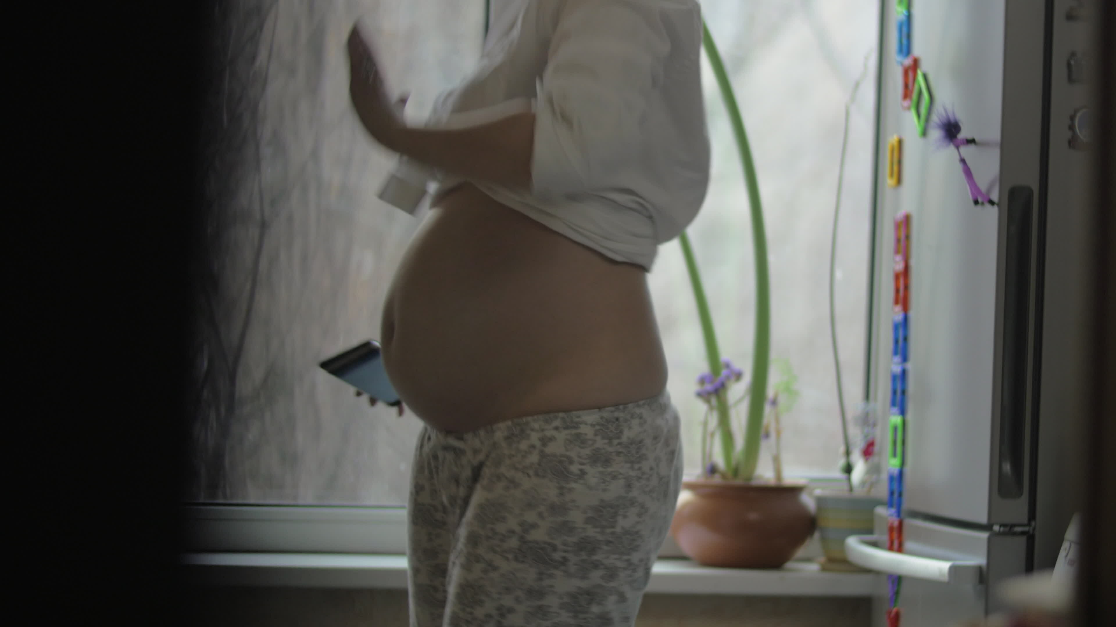 Happy and active pregnant woman dancing at home 28772212 Stock Video at Vecteezy