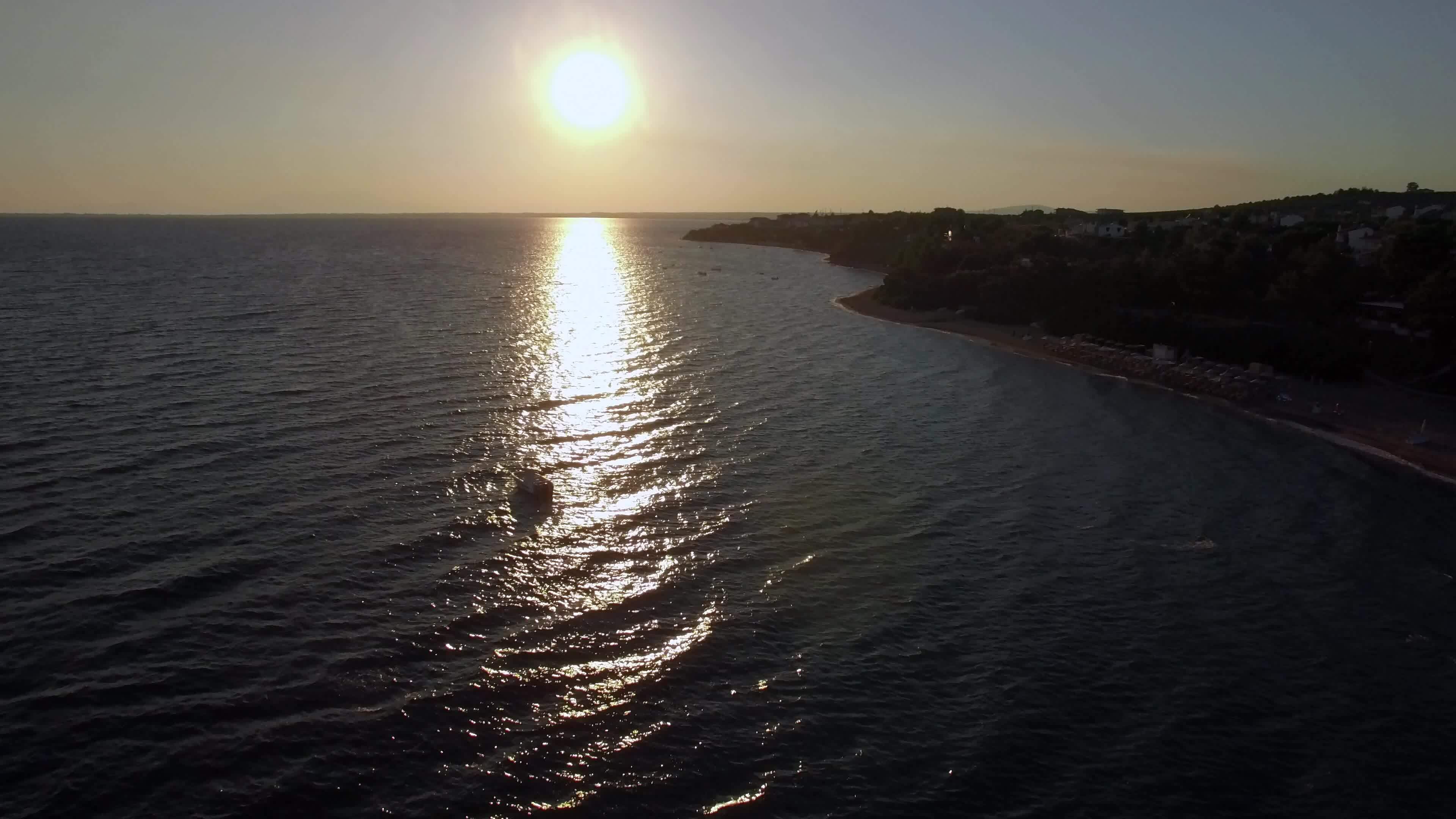 Aerial view of shoreline and sea with boats at sunset 28799144 Stock ...