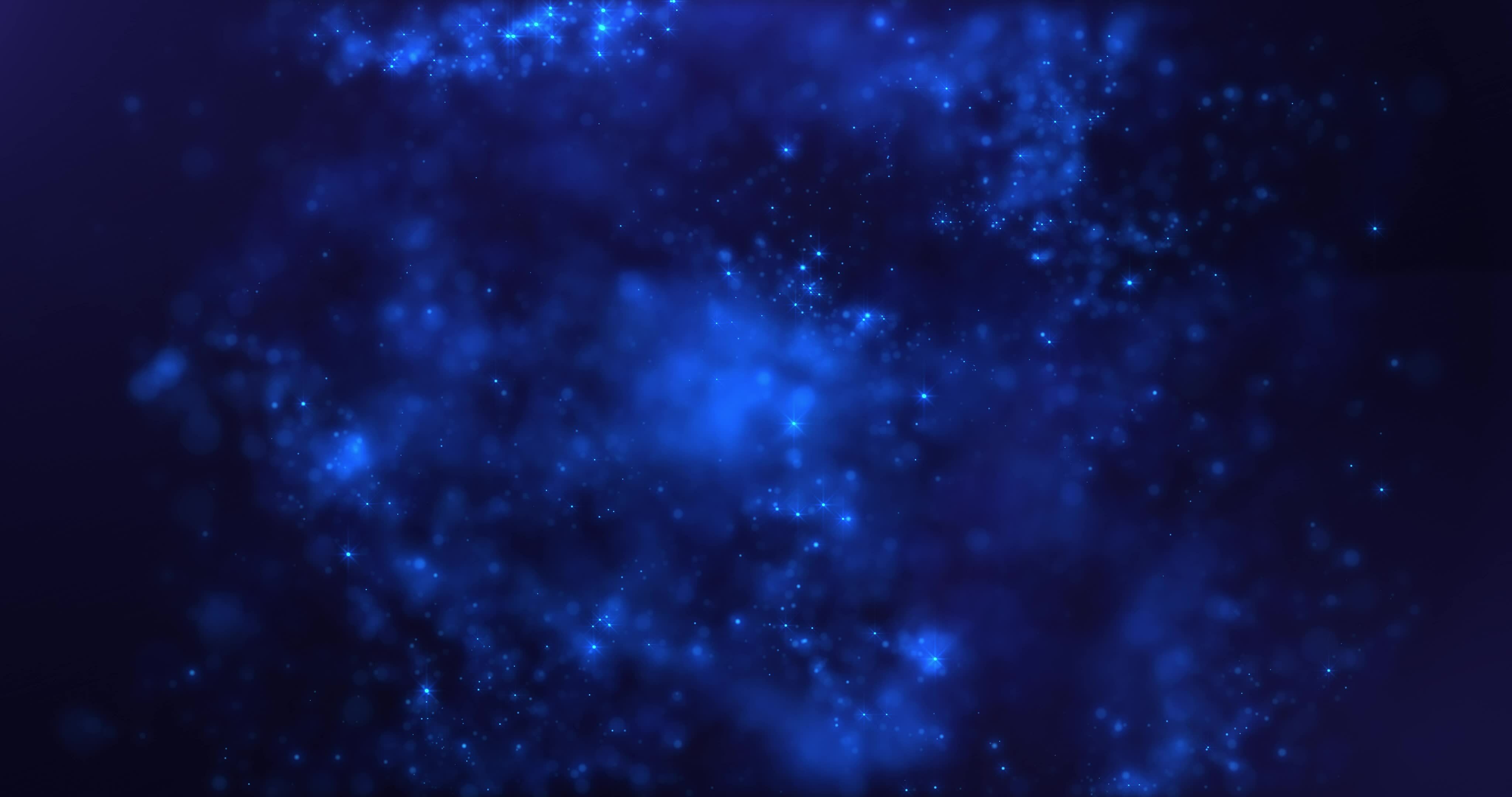 Abstract background of magical shining particles in blue color, particles glow and move ...