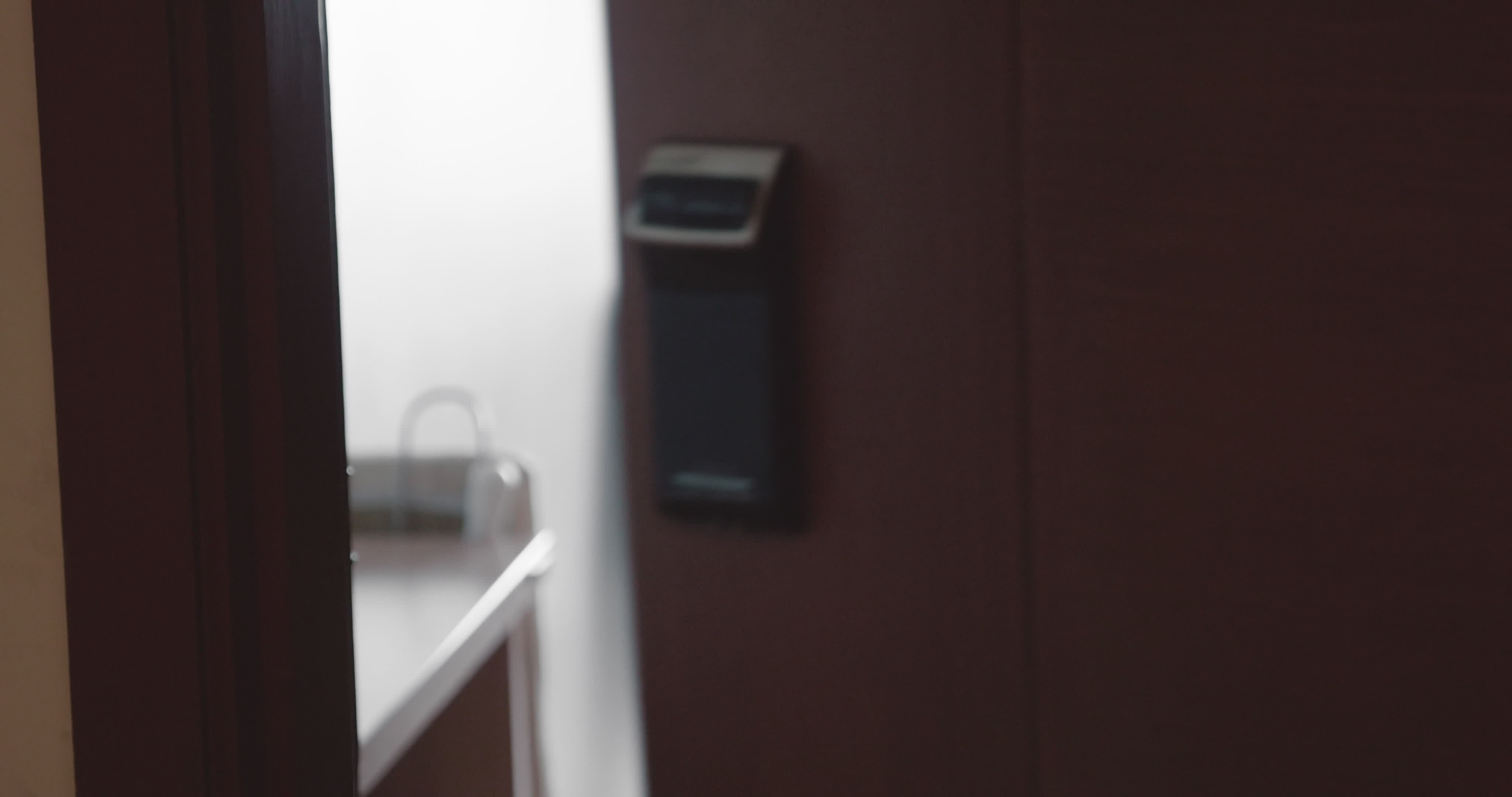 Woman Leaving Hotel Room Digital Lock Activated After Closing The Door 29584636 Stock Video At