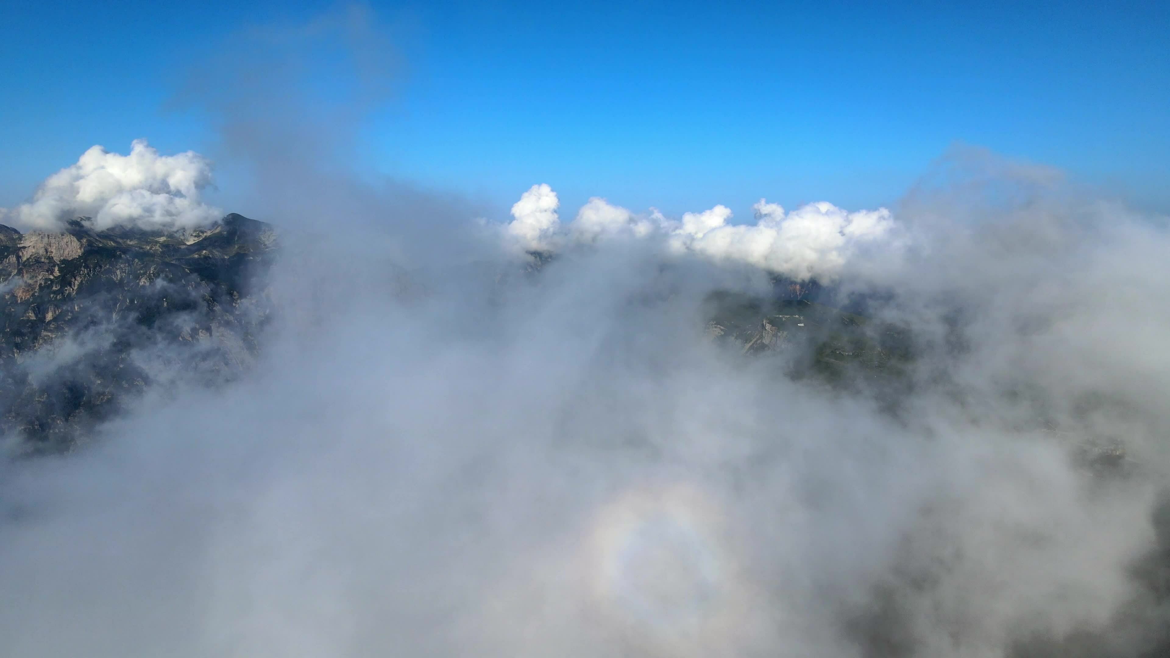 Flying Through The Clouds And Over Mountains 29605892 Stock Video At flying-through-the-clouds-and-over-mountains-29605892-stock-video-at