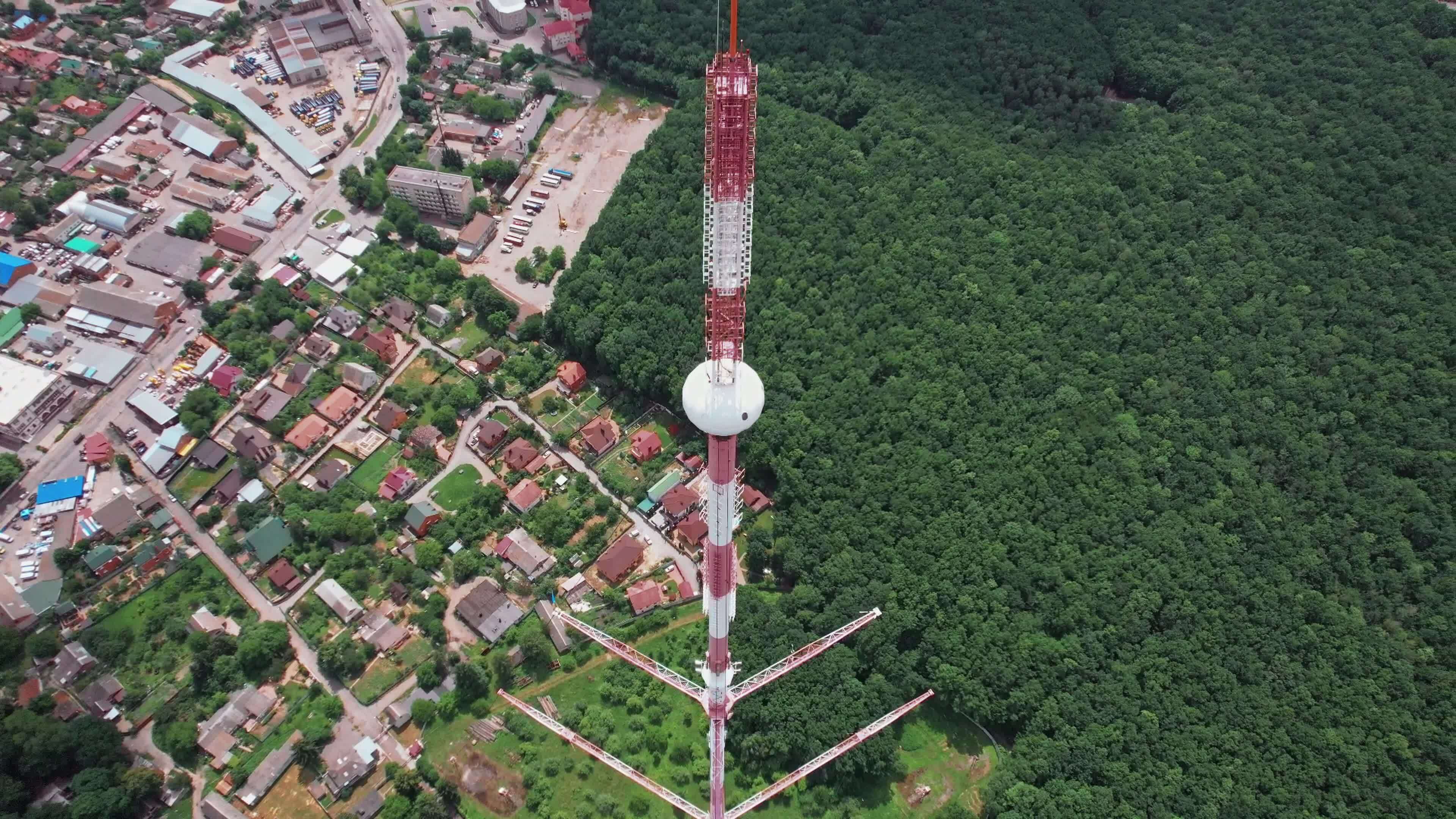 Telecommunication antennas over the city. Cellular and Internet tower with antennas. 4k stock ...