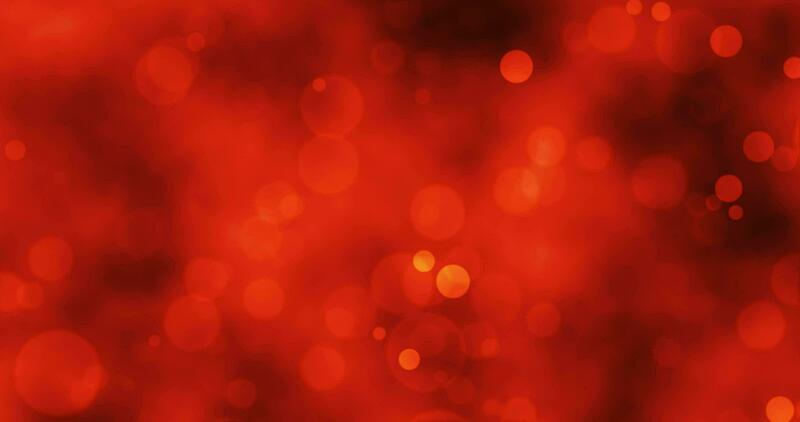 Orange particles and beautiful bokeh. Animation loop of shiny particles. shot with depth of ...