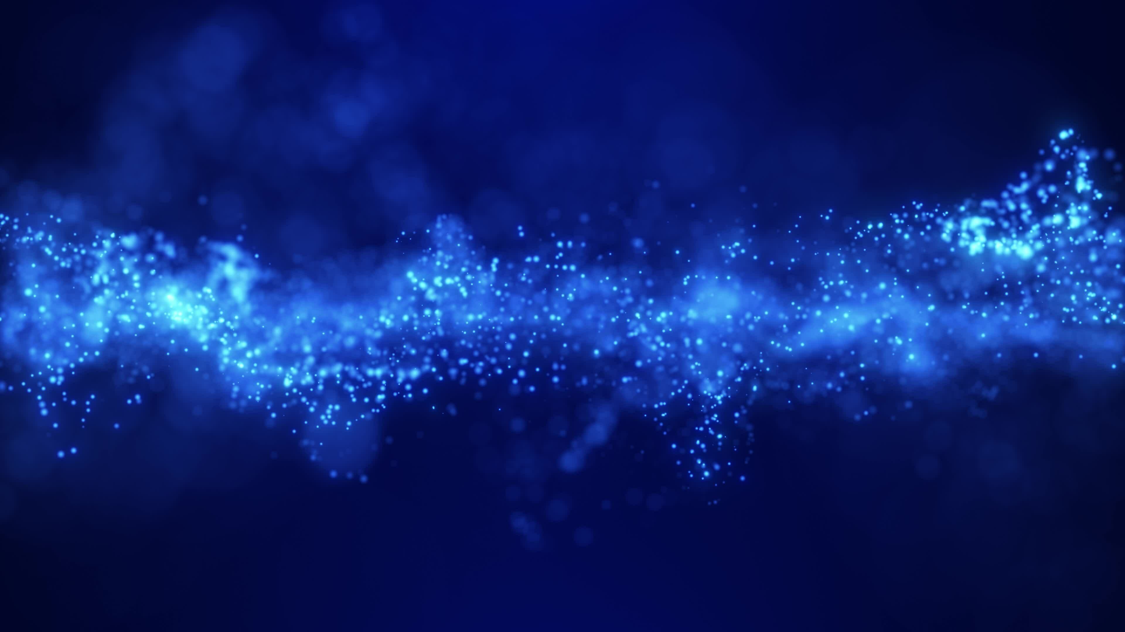Abstract background of magic particles in blue color, particles glow ...