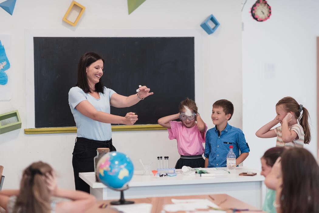 Teacher Teaching Stock Photos, Images and Backgrounds for Free Download
