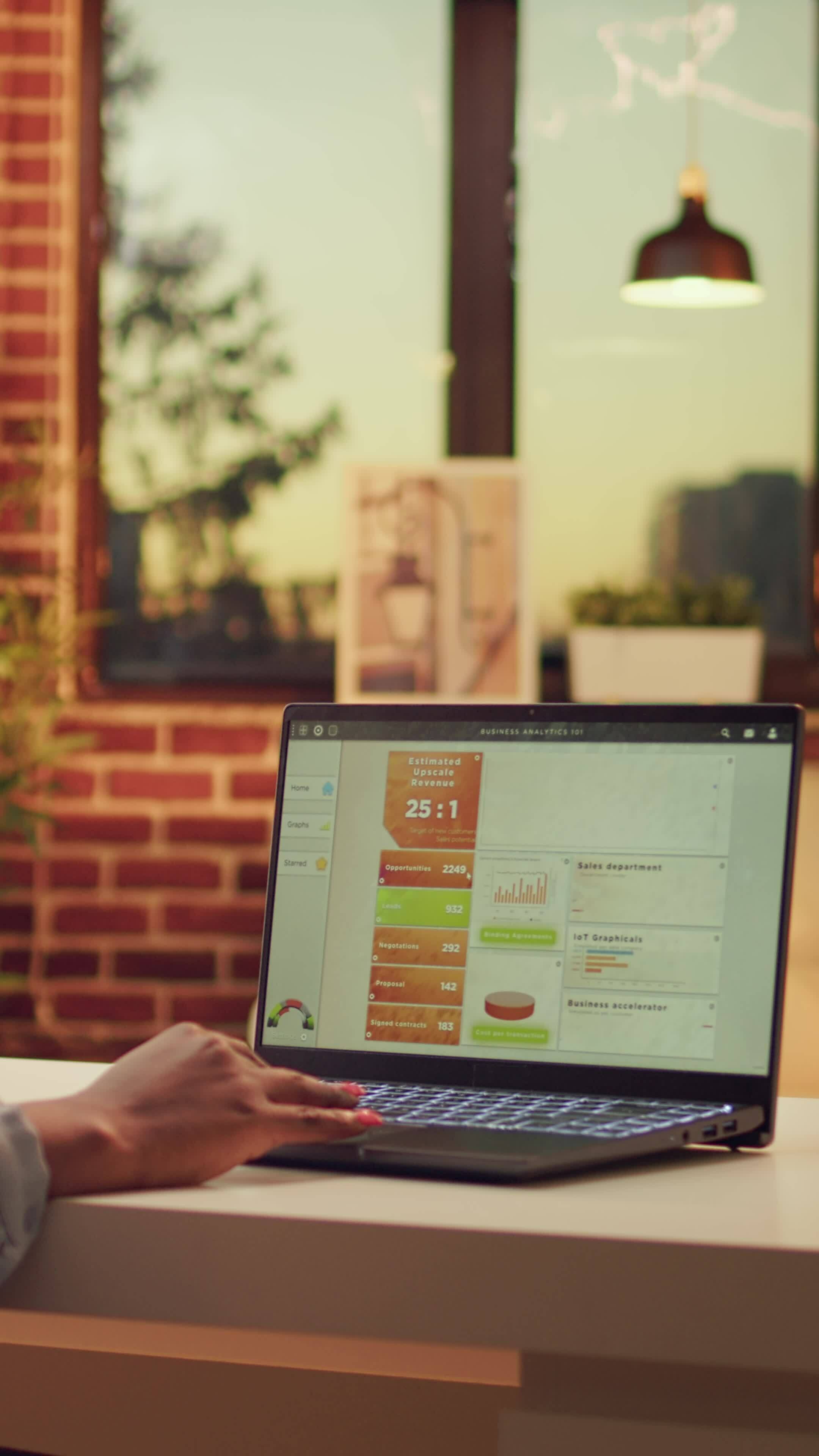 Vertical video Self employed worker analyzing sales from home office ... Vertical video Self employed worker analyzing sales from home office ...