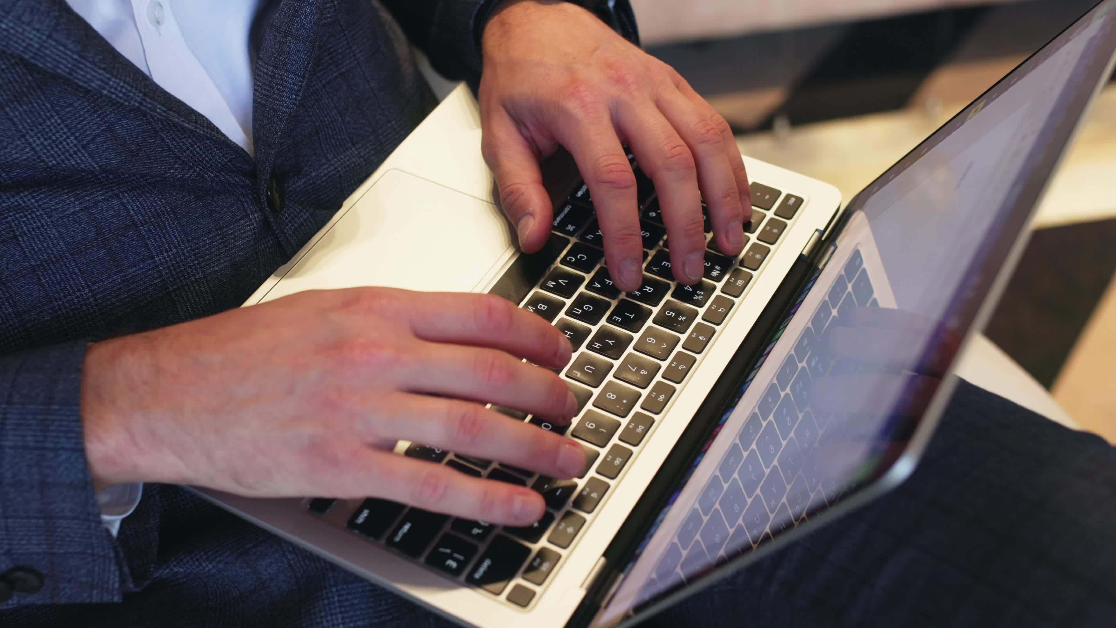 Hands write text messages on a laptop keyboard close-up. Busy ... Hands write text messages on a laptop keyboard close-up. Busy ...