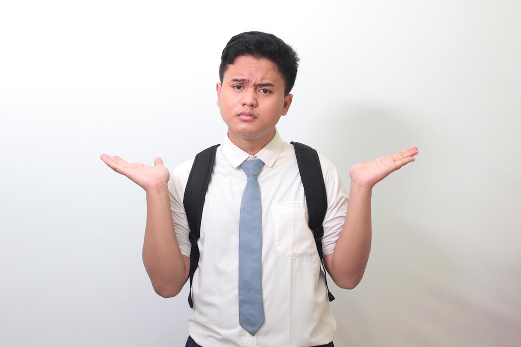 Confused Student Stock Photos, Images and Backgrounds for Free Download