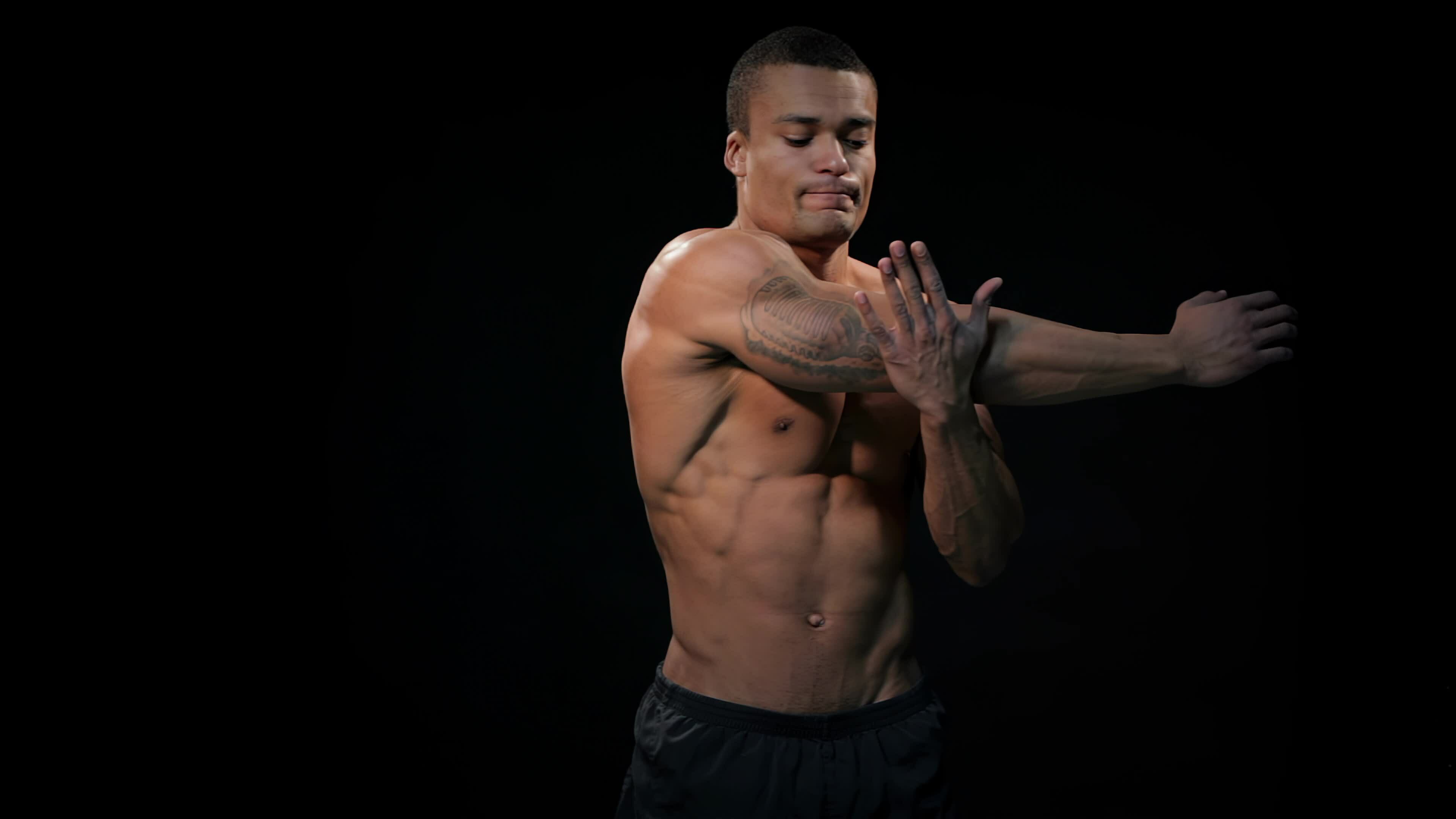 Muscular Athletic Man Stretches His Hands 31744521 Stock Video At Vecteezy