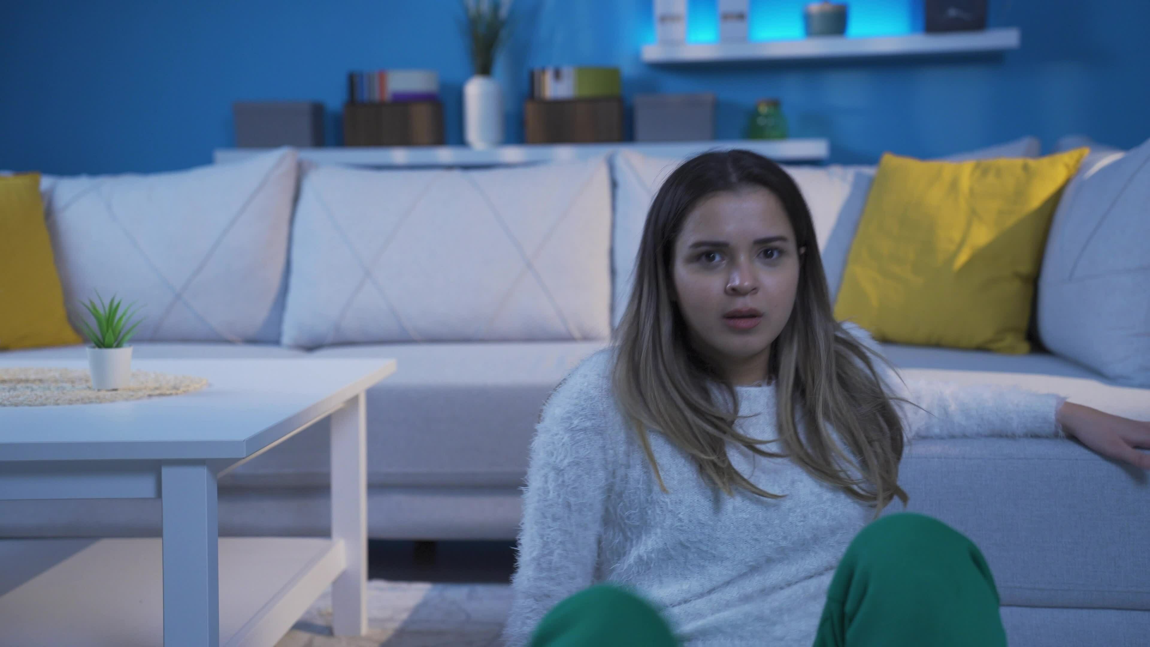 The mentally ill young woman becomes paranoid and flees the camera in doubt and fear. 32194889 ...