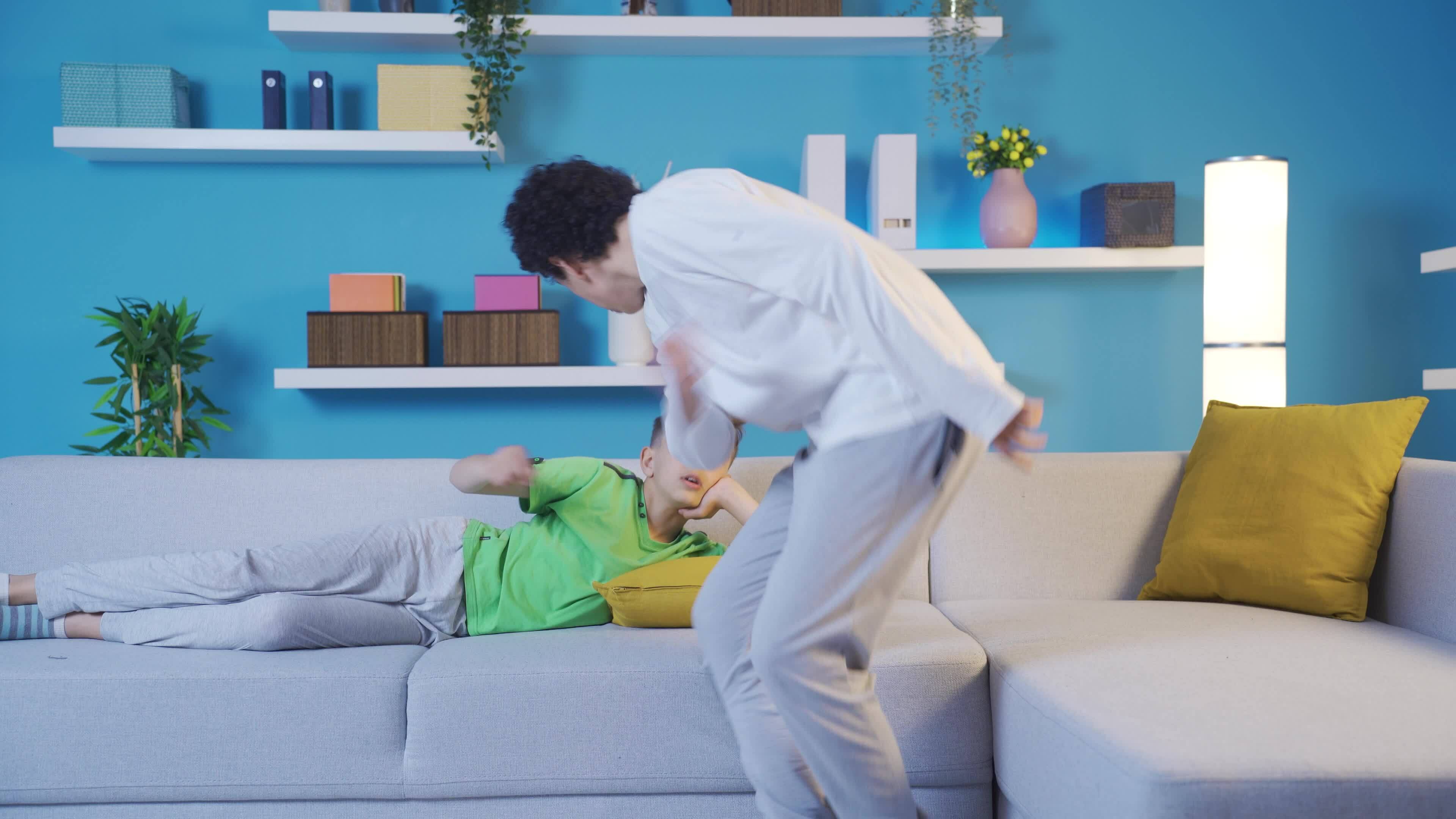 Two brothers, who can't get along, fight at home over the TV remote ...