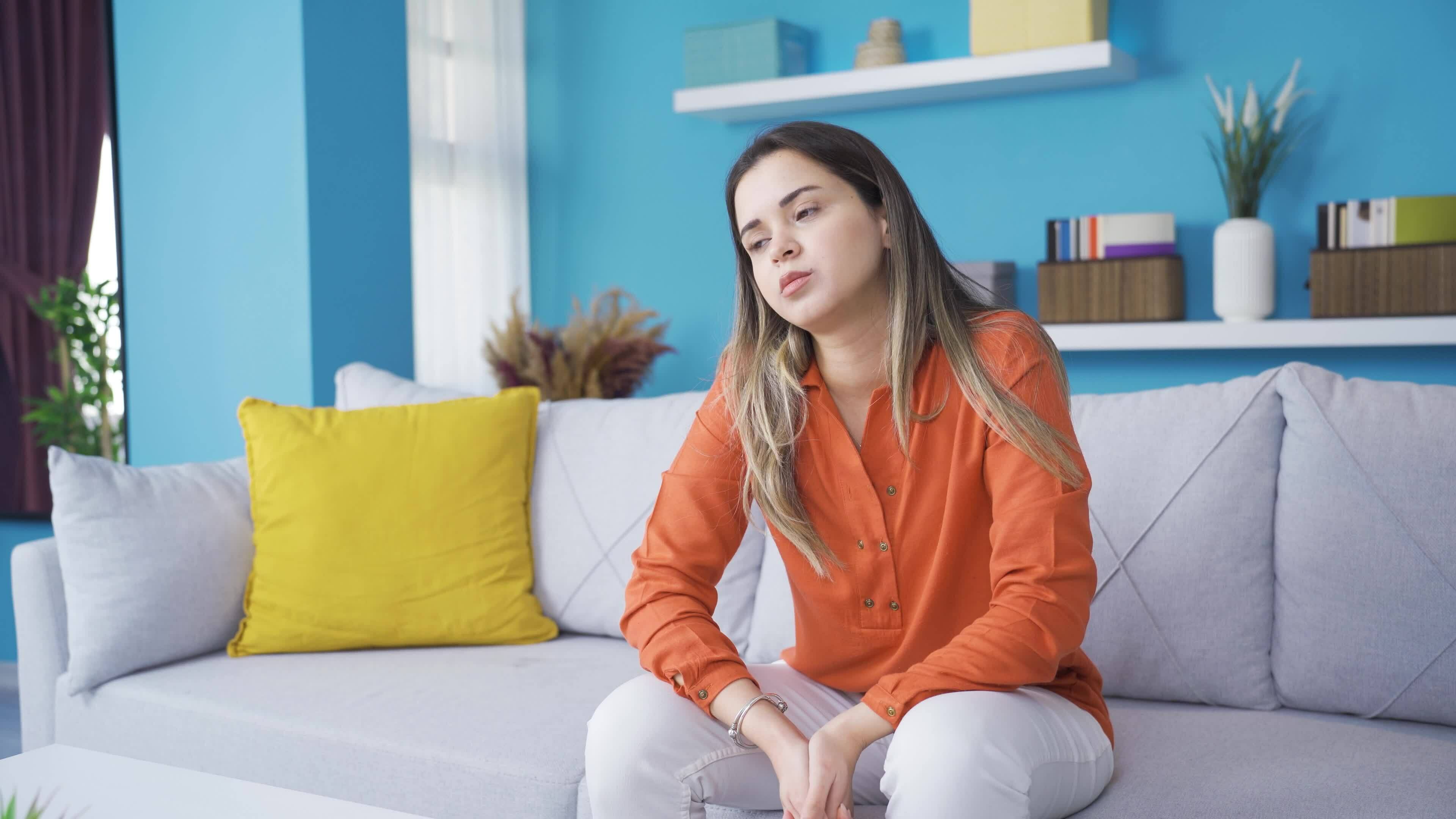 Unhappy and overwhelmed young woman at home. 32425567 Stock Video at ... Unhappy and overwhelmed young woman at home. 32425567 Stock Video at ...