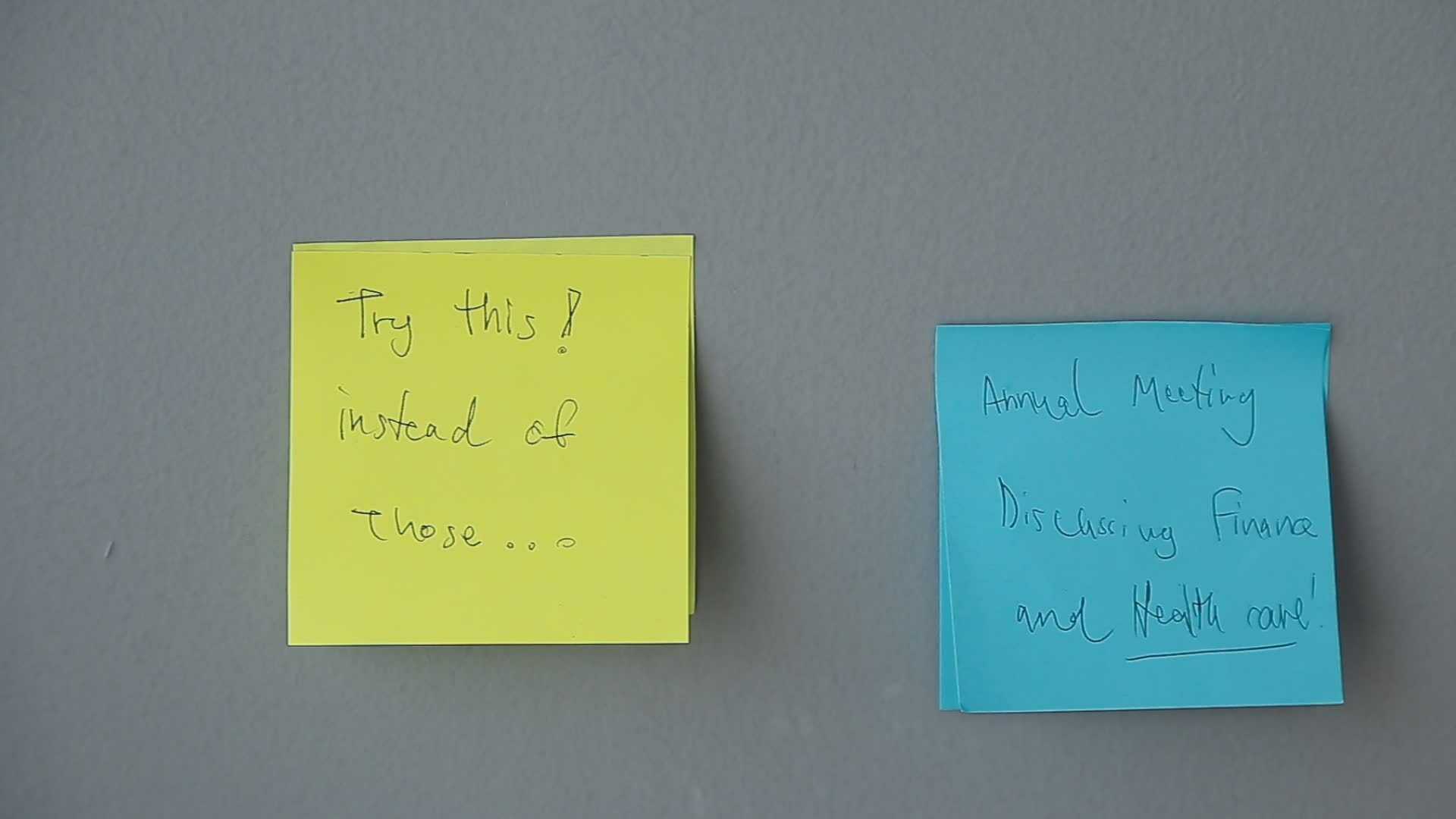 Business people meeting at office writing memos on sticky notes ...