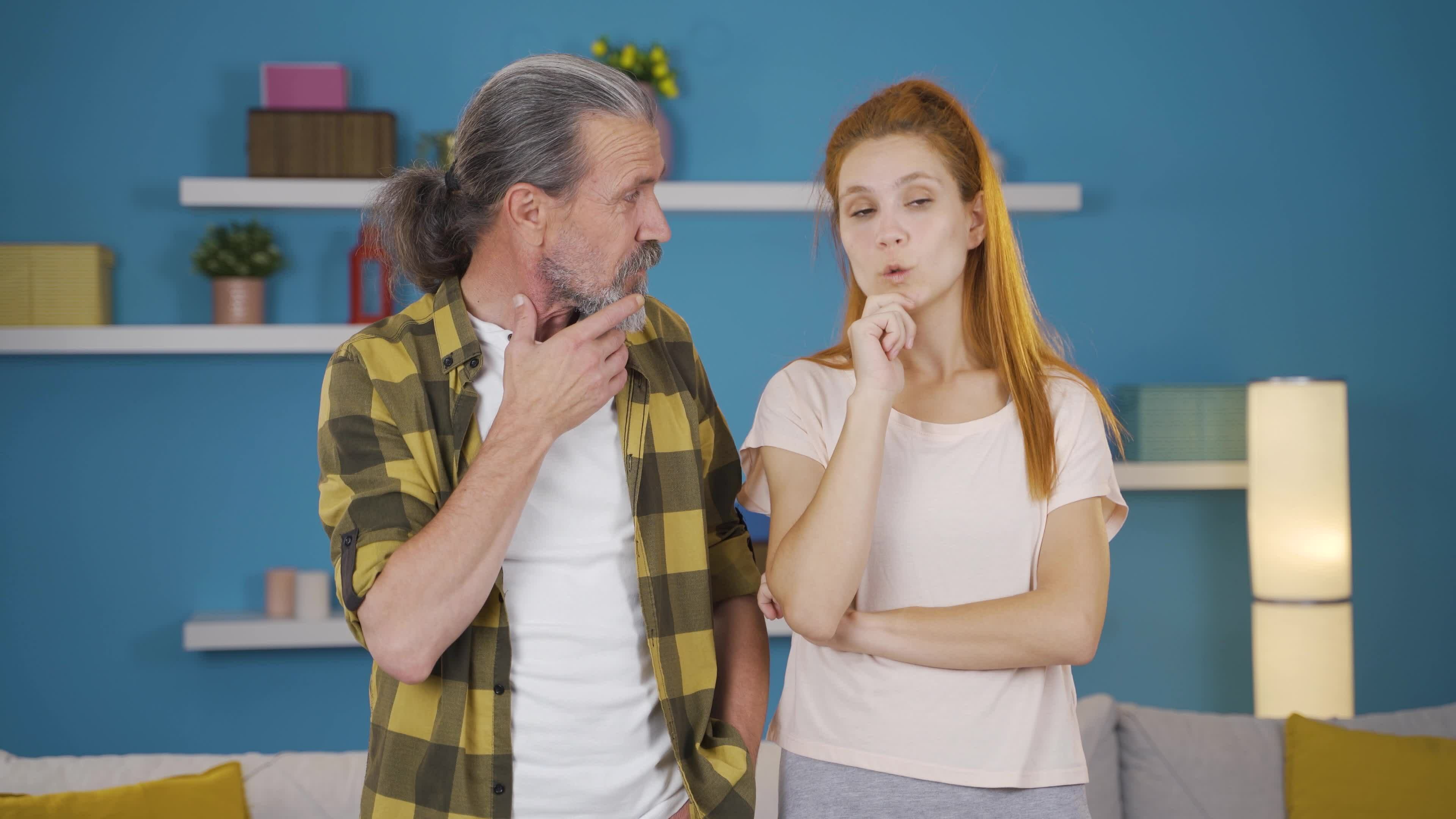 Confused father and daughter, thoughtful. 32966233 Stock Video at Vecteezy