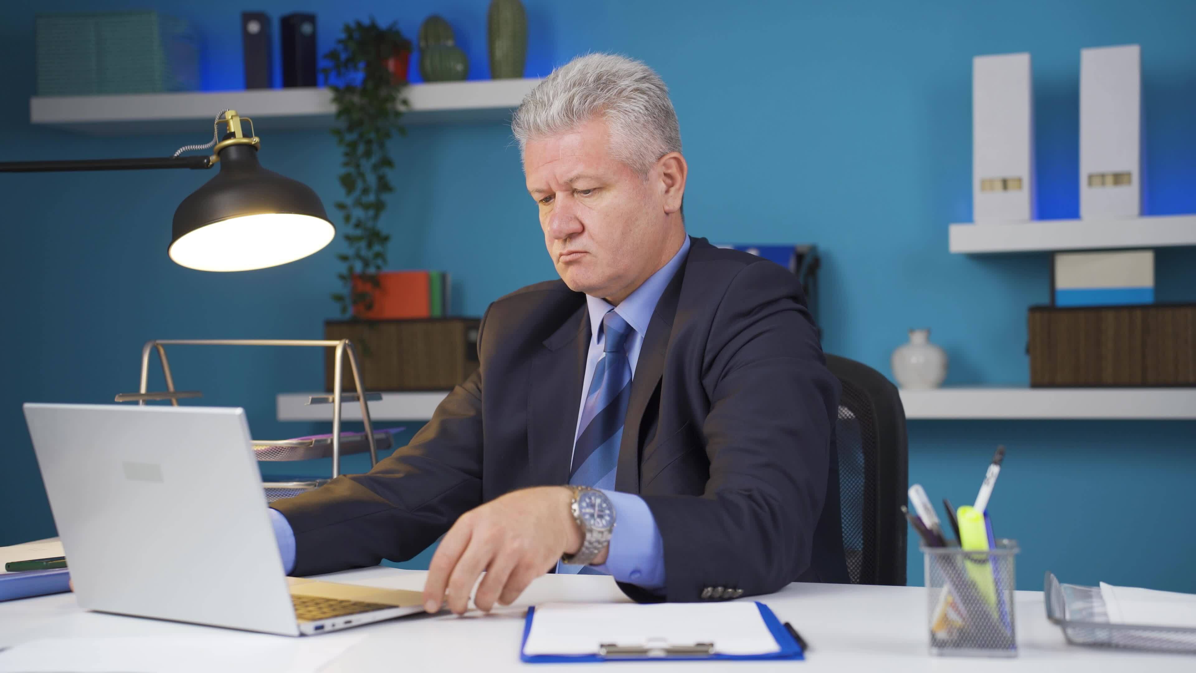 Frustrated businessman on laptop. 33057201 Stock Video at Vecteezy