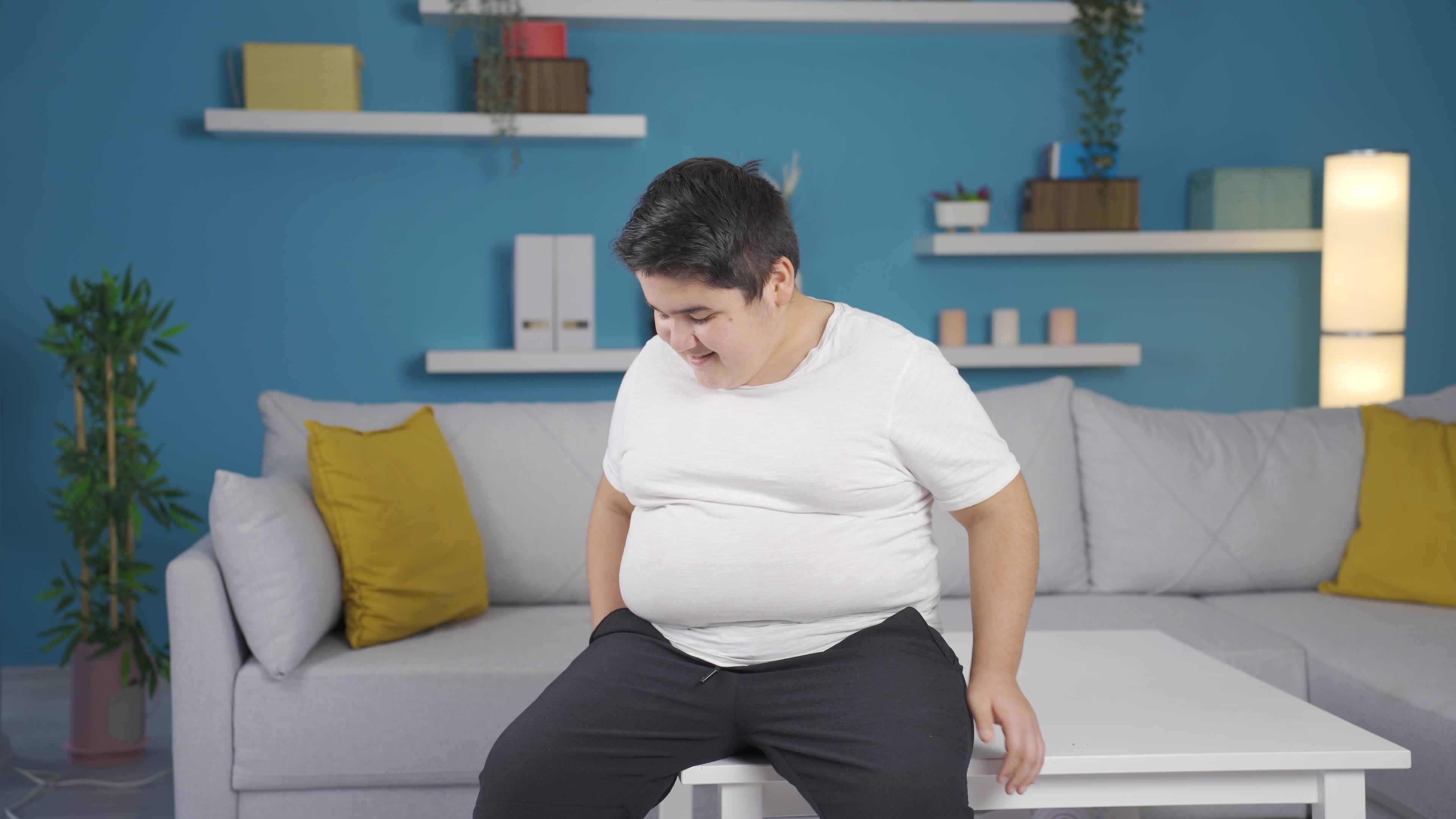 Obesity boy having trouble moving. 33060002 Stock Video at Vecteezy Obesity boy having trouble moving. 33060002 Stock Video at Vecteezy