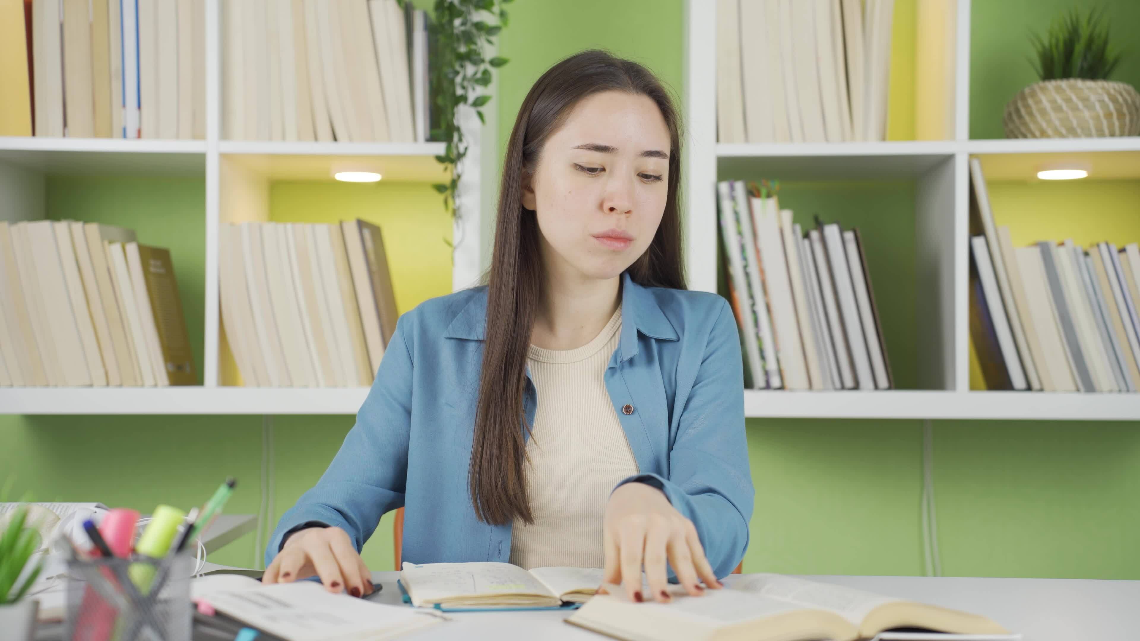 Asian teenage girl confused, thinking, not understanding. 33066687 Stock Video at Vecteezy