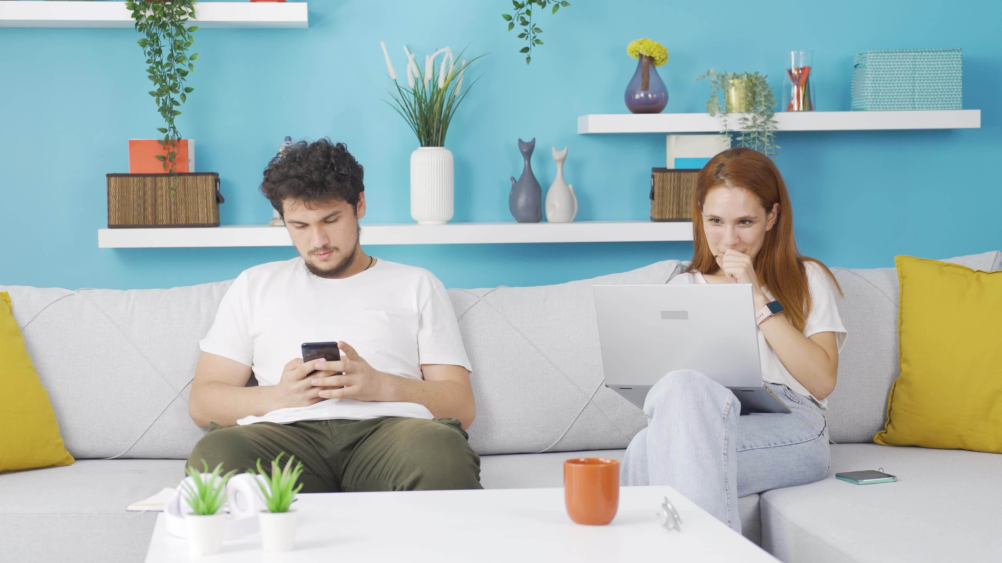 A woman hiding something from her husband. Confidential work. 33066976 Stock Video at Vecteezy