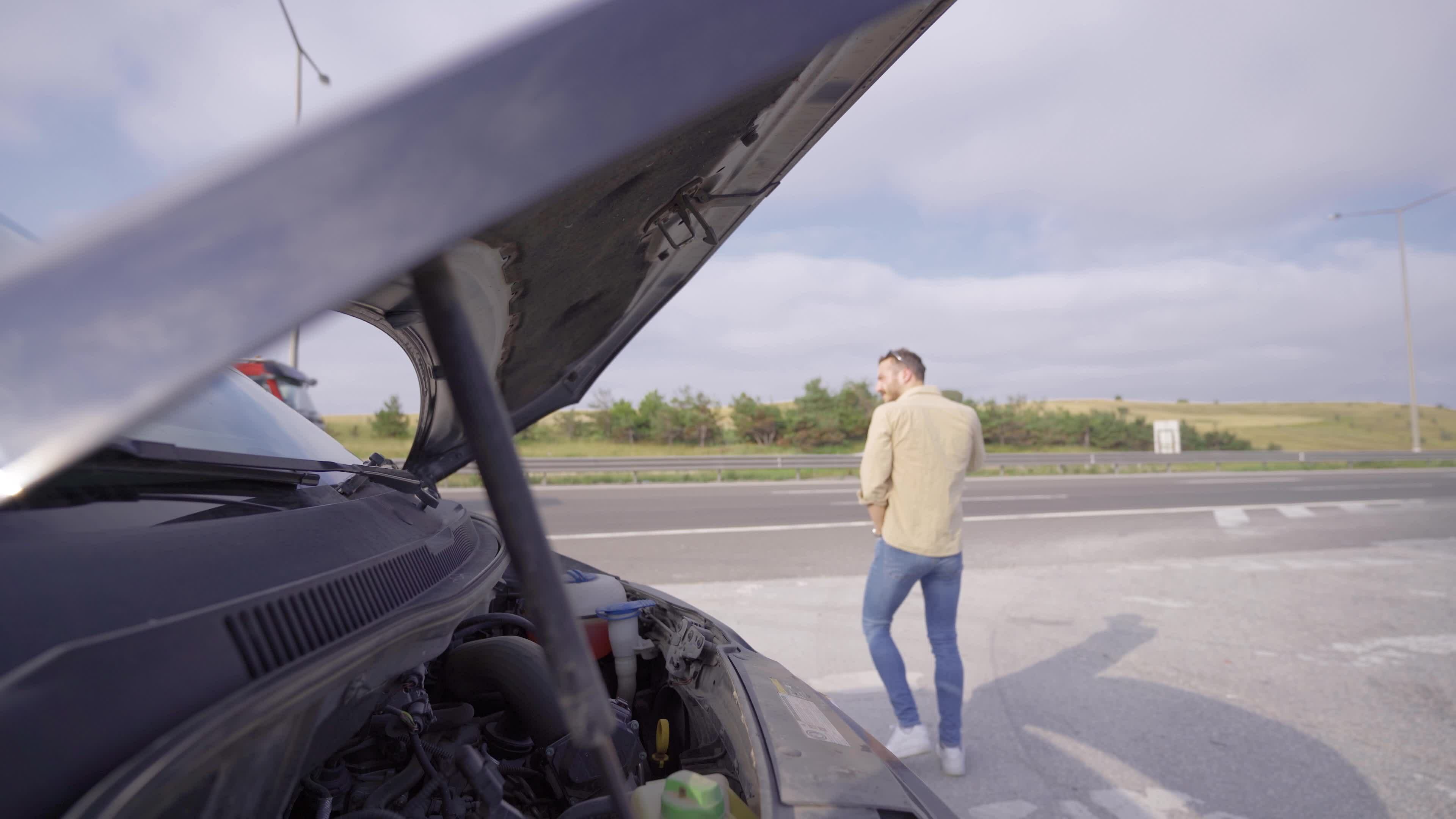 Car breakdown, highway. 33087147 Stock Video at Vecteezy