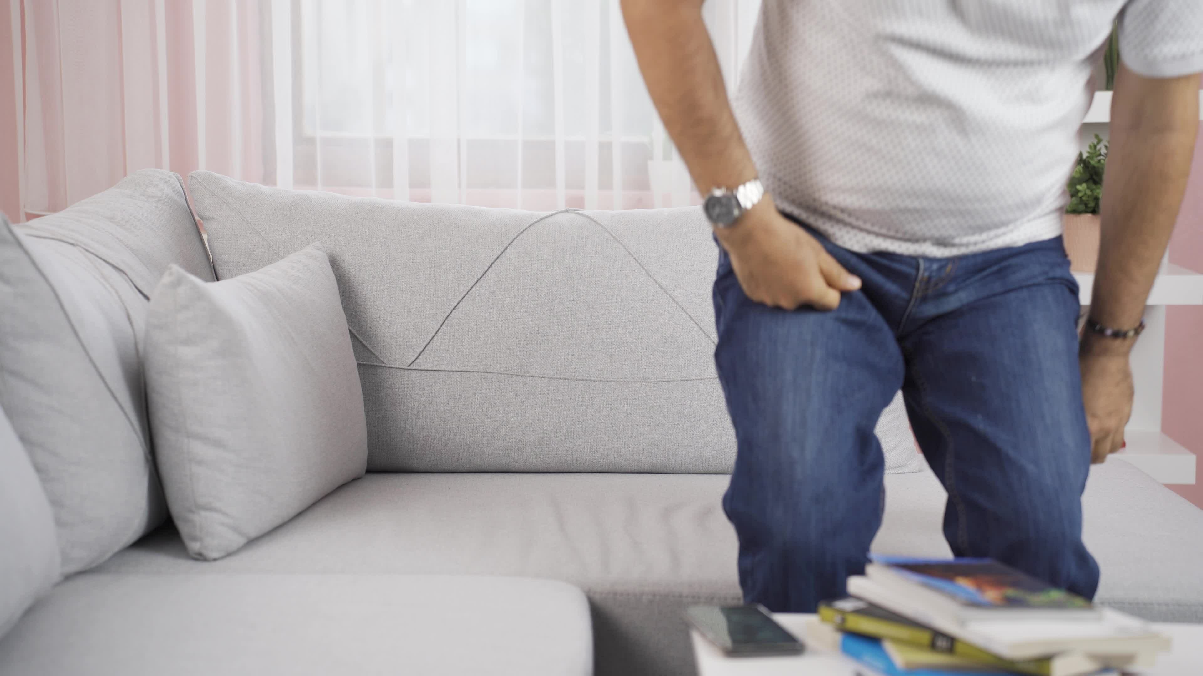 Happy man lying on the sofa. He is resting. 33170839 Stock Video at ...