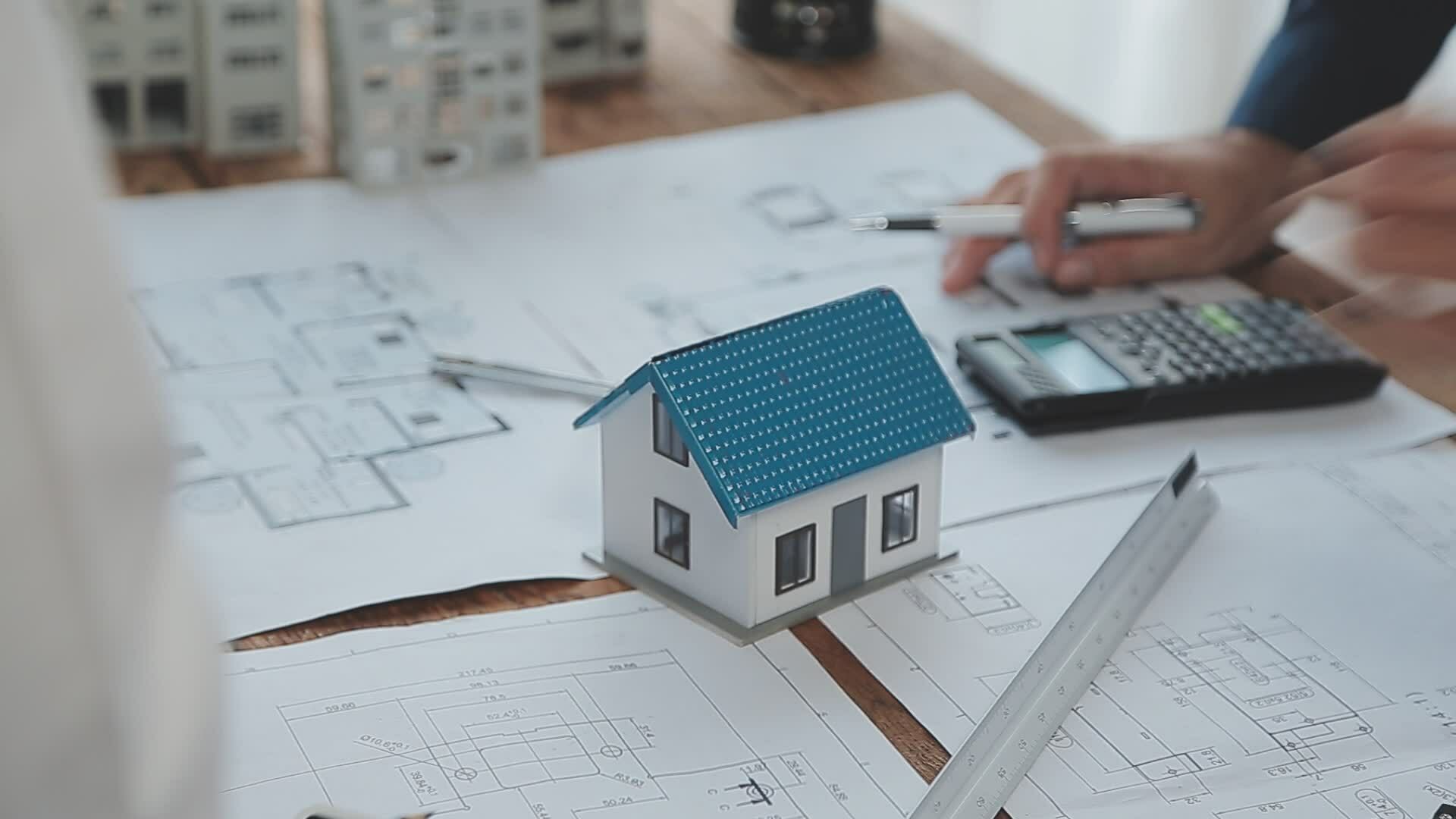 Architectural engineer team meeting Use of blueprints, construction ...