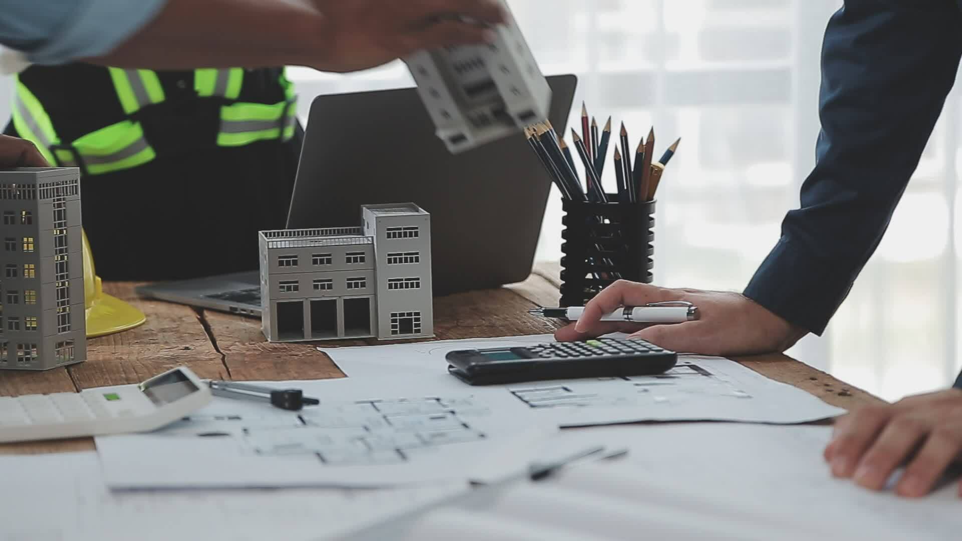 Architectural engineer team meeting Use of blueprints, construction ...