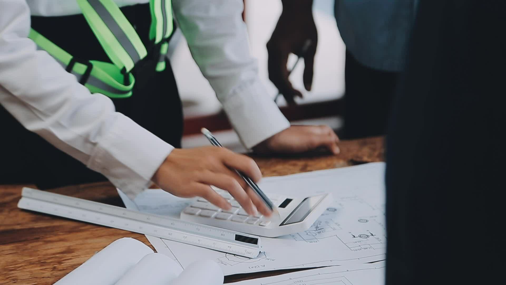 Architectural engineer team meeting Use of blueprints, construction ...