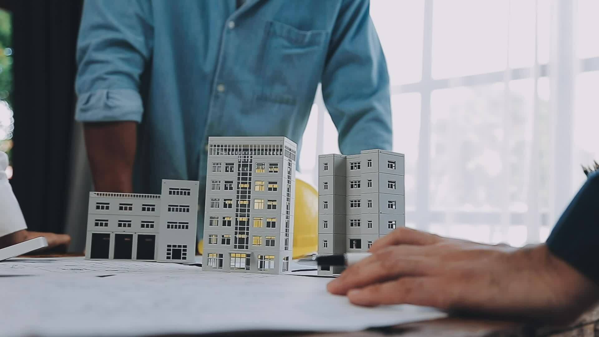 Architectural engineer team meeting Use of blueprints, construction ...