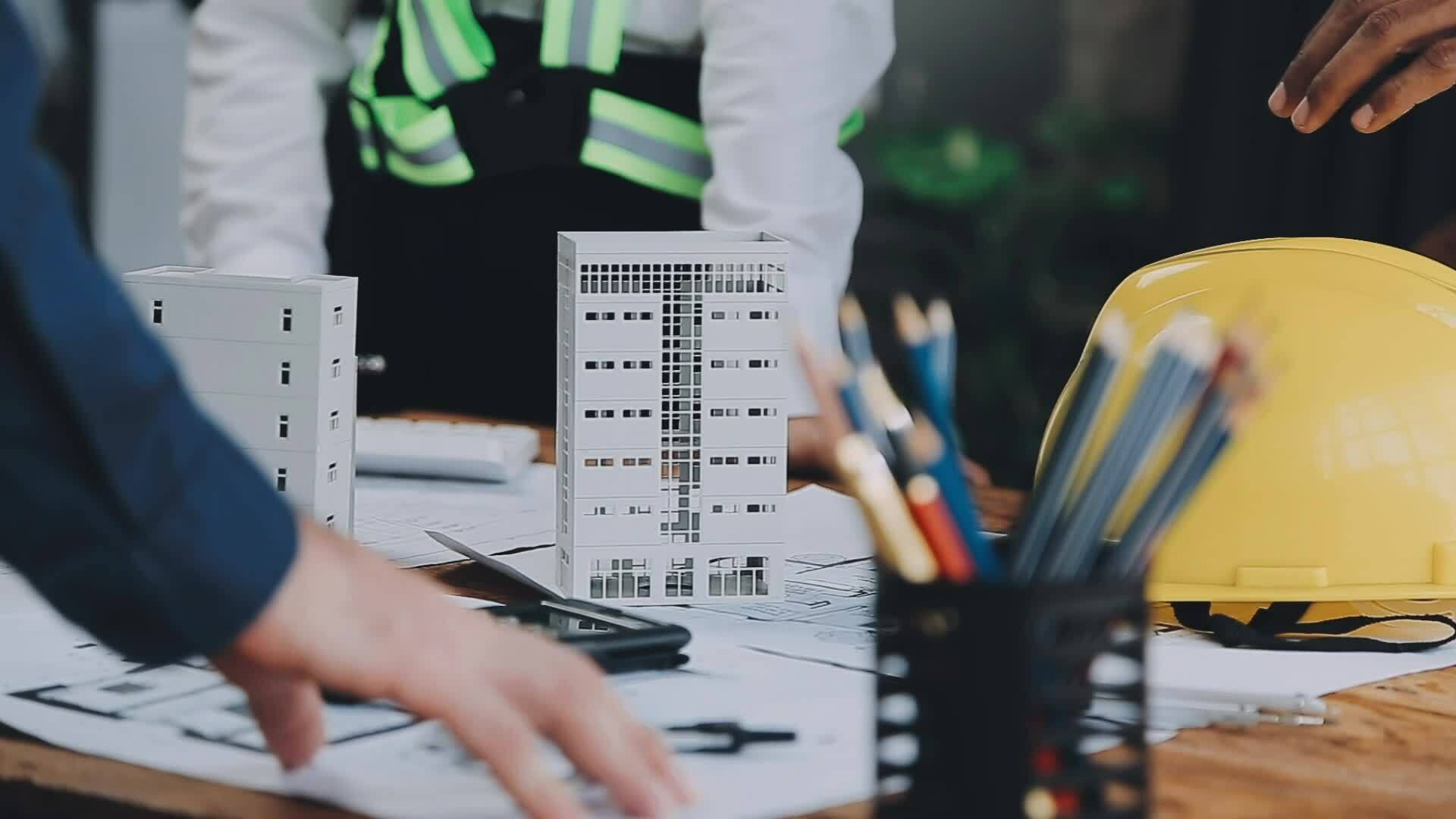 Architectural engineer team meeting Use of blueprints, construction ...