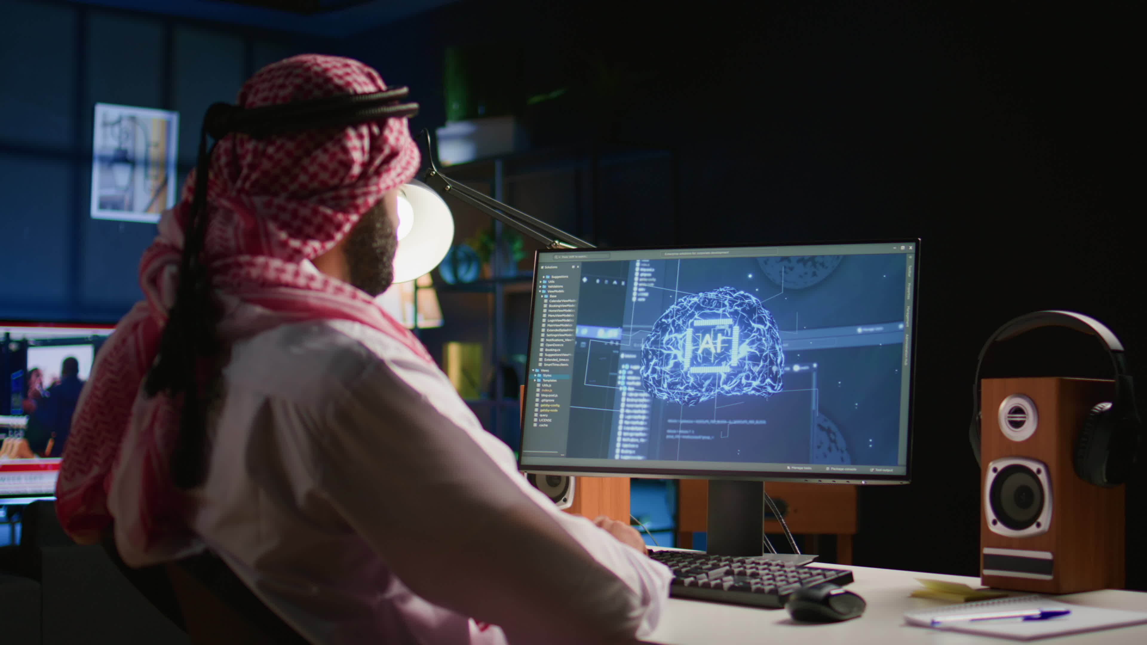 System administrator in personal office running programming scripts on ... System administrator in personal office running programming scripts on ...