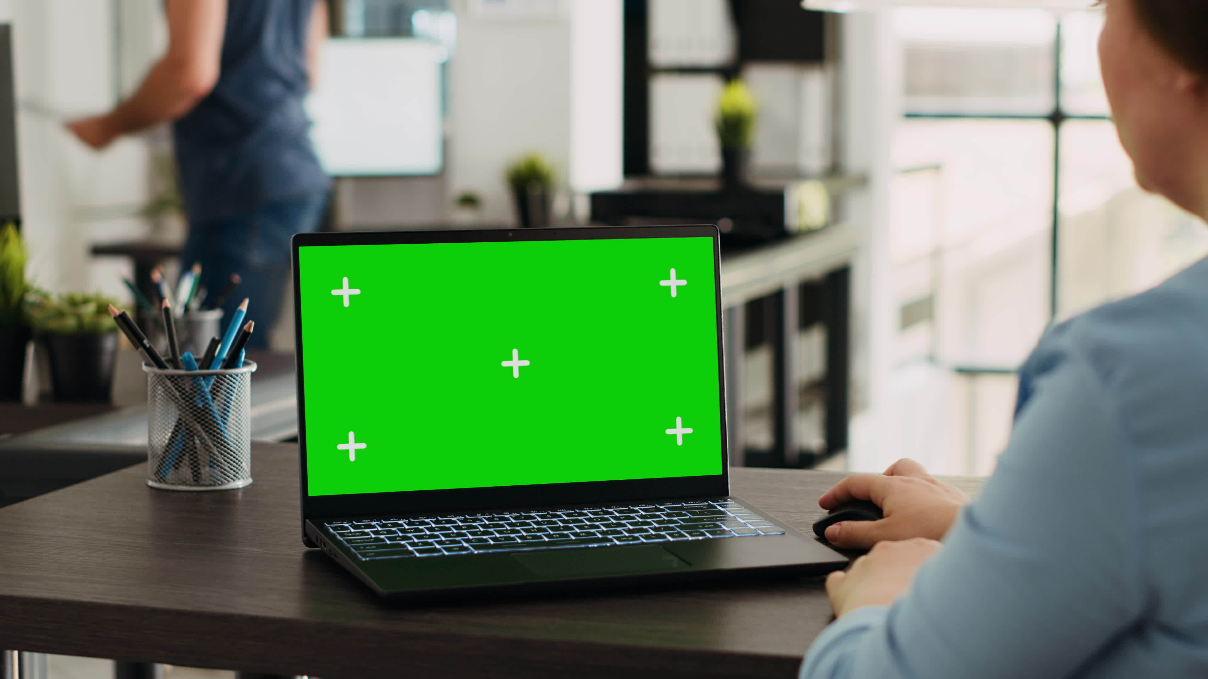 Company Specialist Using Laptop With Greenscreen Template Working With