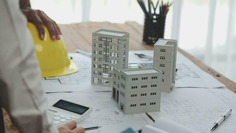 Architectural engineer team meeting Use of blueprints, construction ...