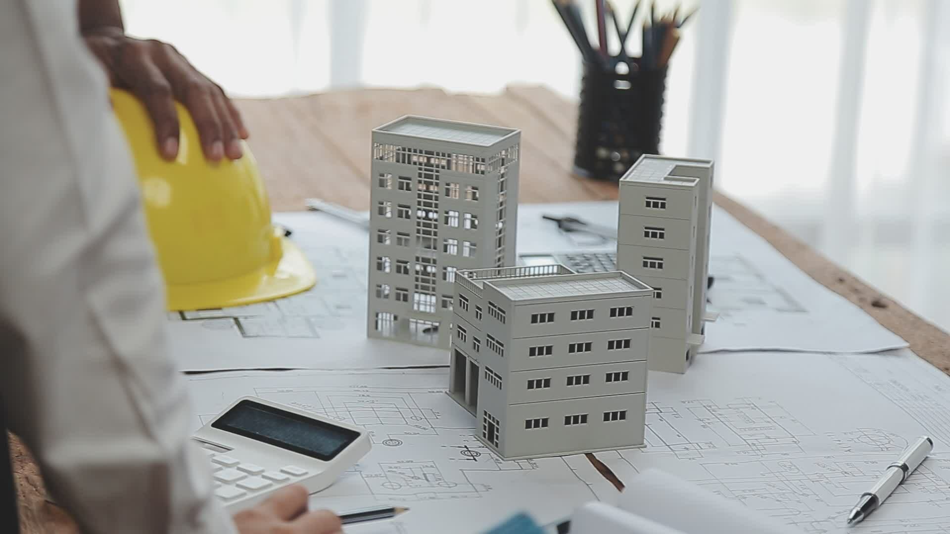 Architectural engineer team meeting Use of blueprints, construction ...