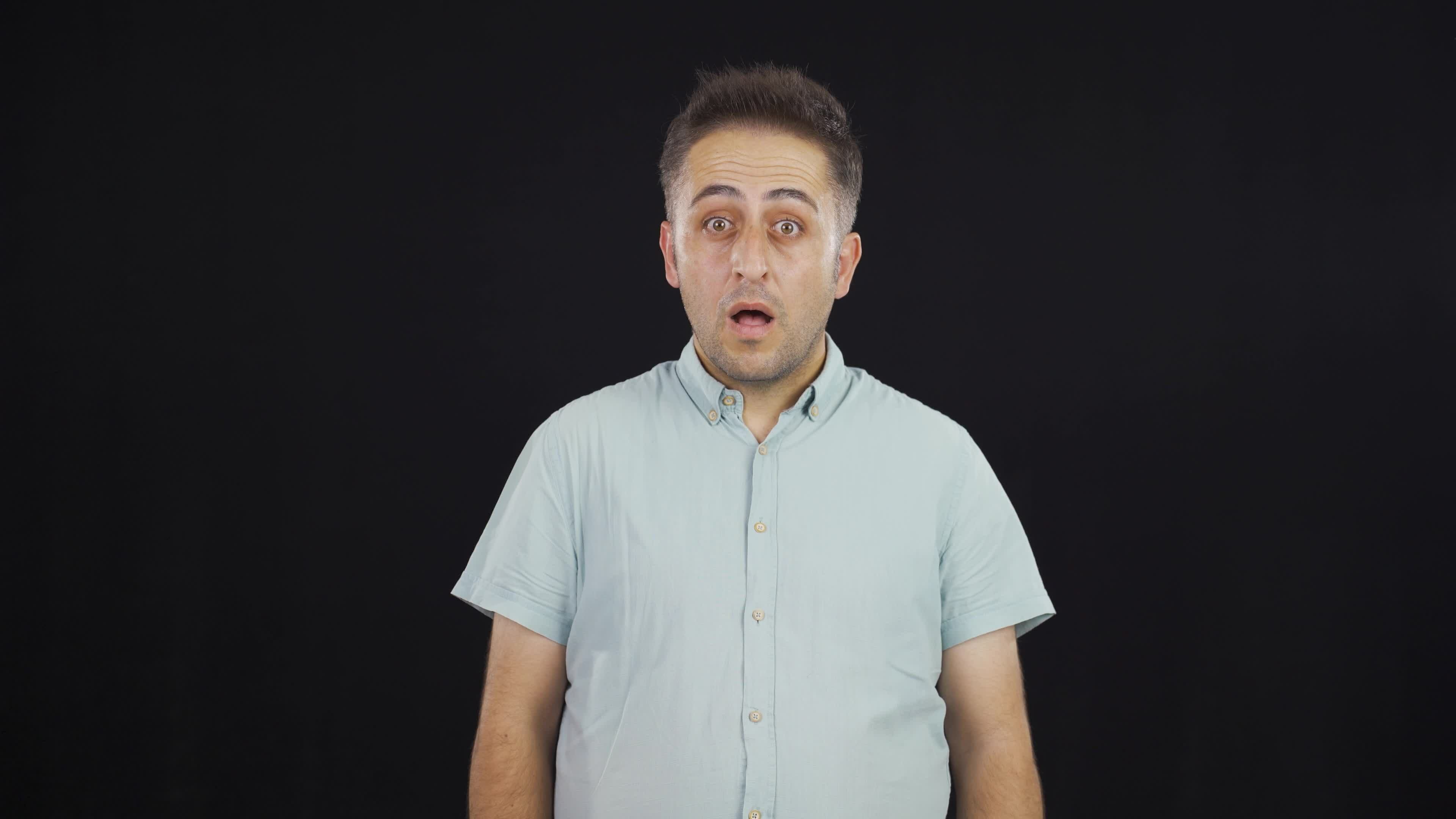Man looking at camera in amazement. 33545619 Stock Video at Vecteezy