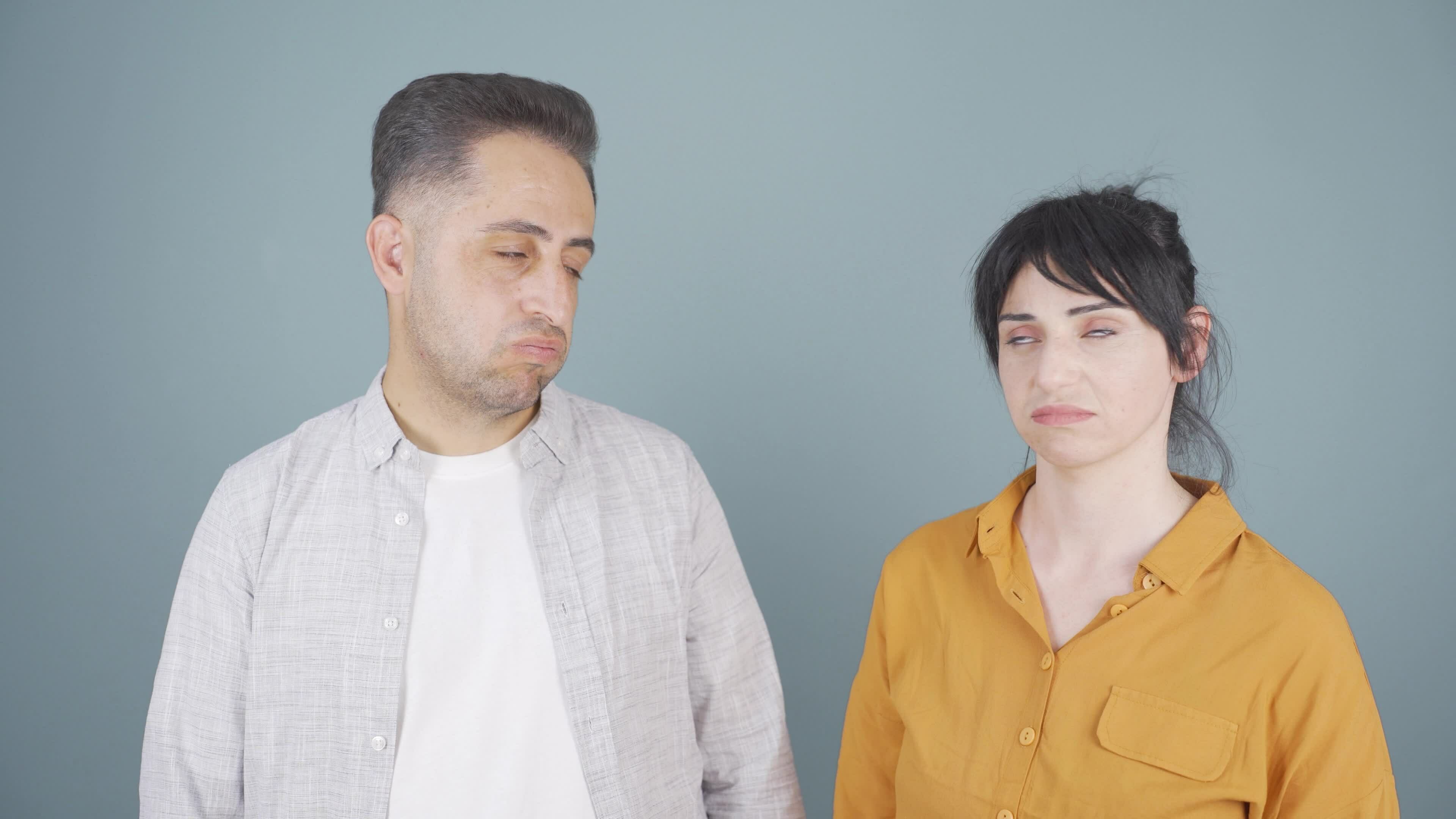 The couple, bored of each other, sighs. 33566728 Stock Video at Vecteezy