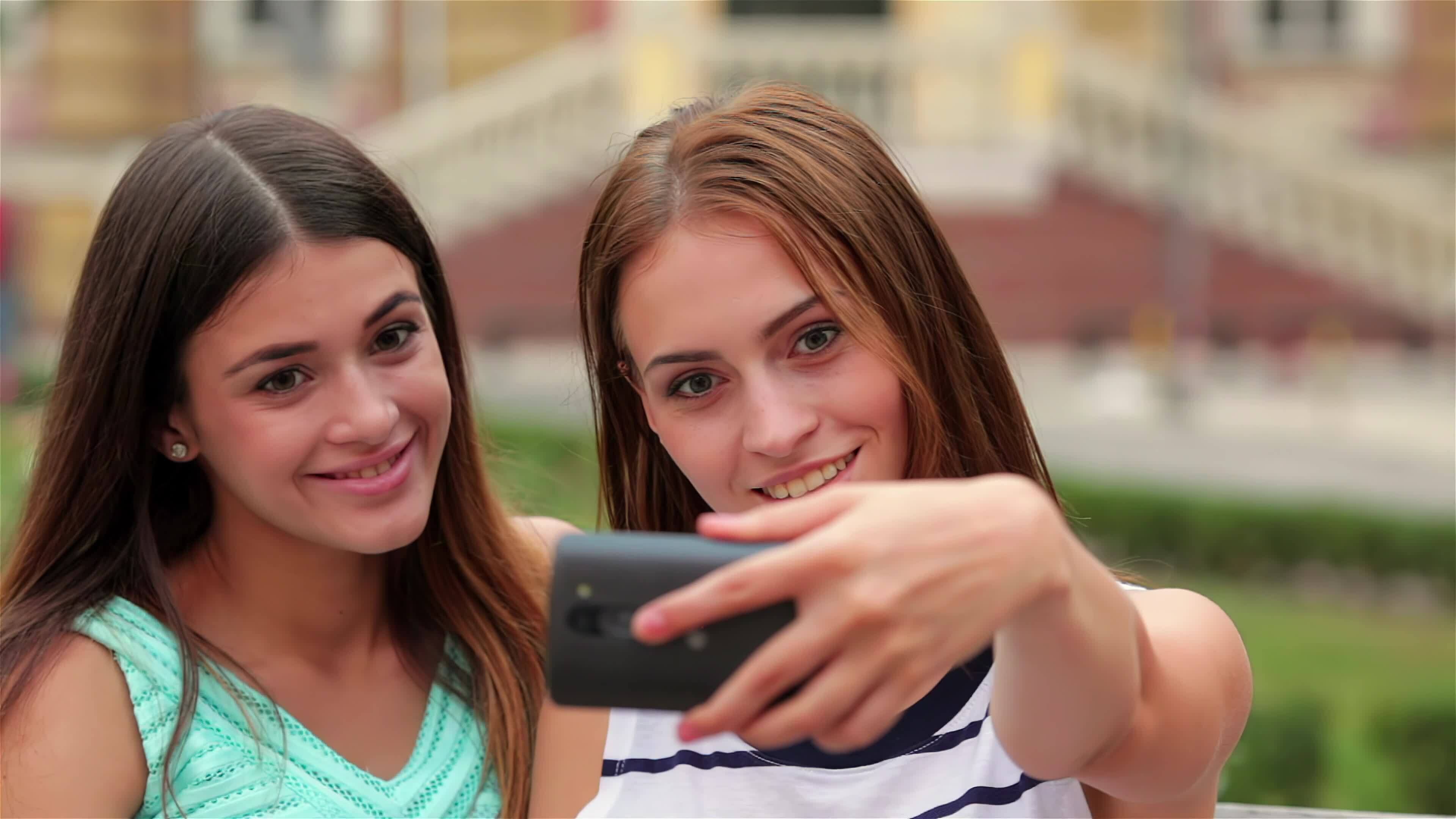 Smiling Girls Taking Selfie With Smartphone Camera 34634264 Stock Video