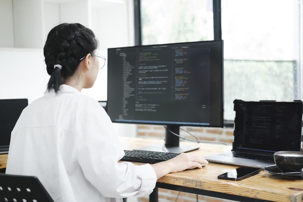Female Programmer Stock Photos, Images and Backgrounds for Free Download