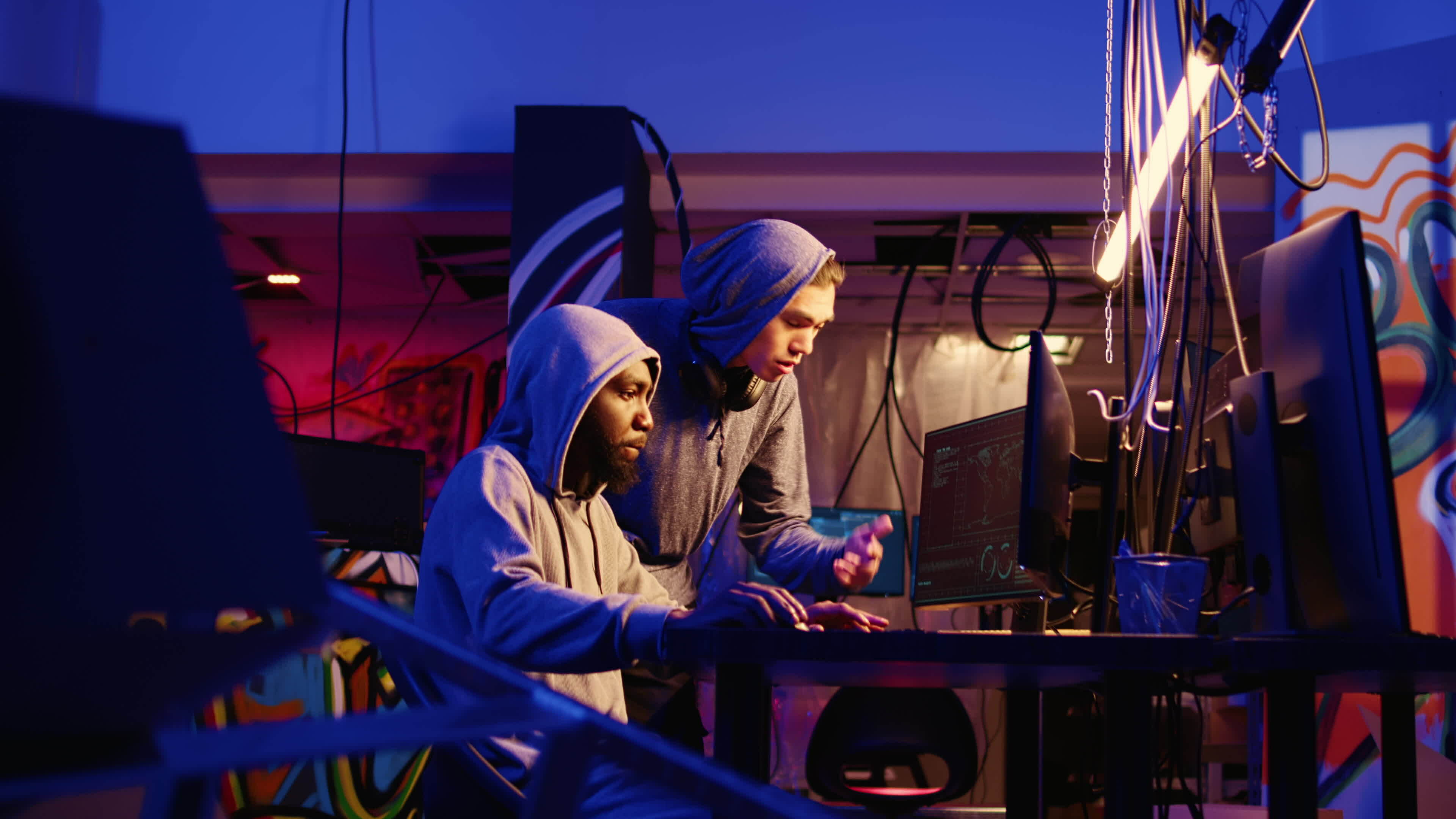 Hackers Brainstorming Ways Of Using Network Vulnerabilities To Exploit Servers Trying To Break