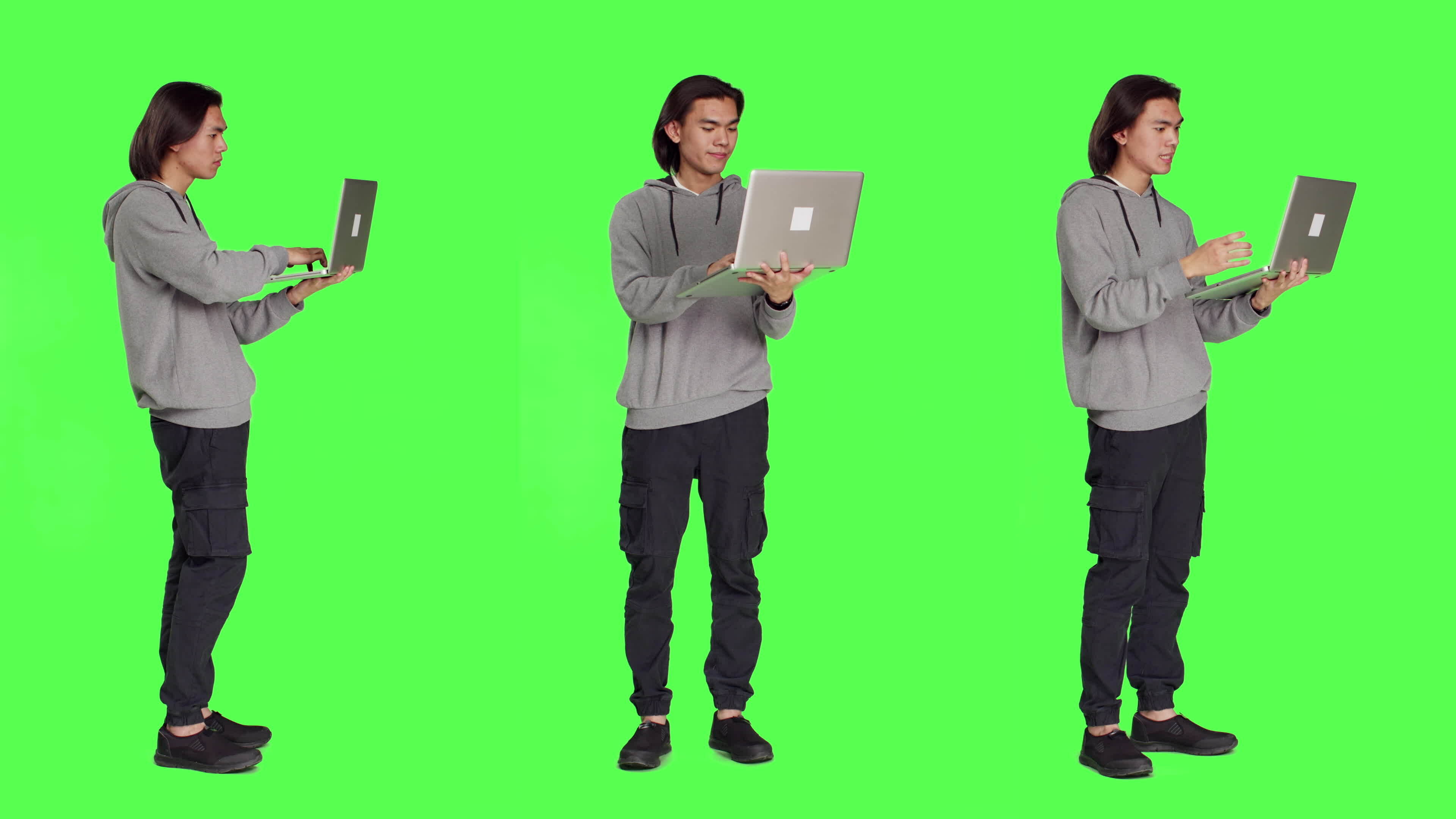 Modern man navigating webpage on laptop standing over full body ... Modern man navigating webpage on laptop standing over full body ...