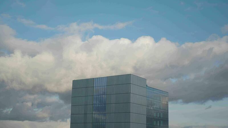 modern city buildings against blue sky 35139590 Stock Video at Vecteezy